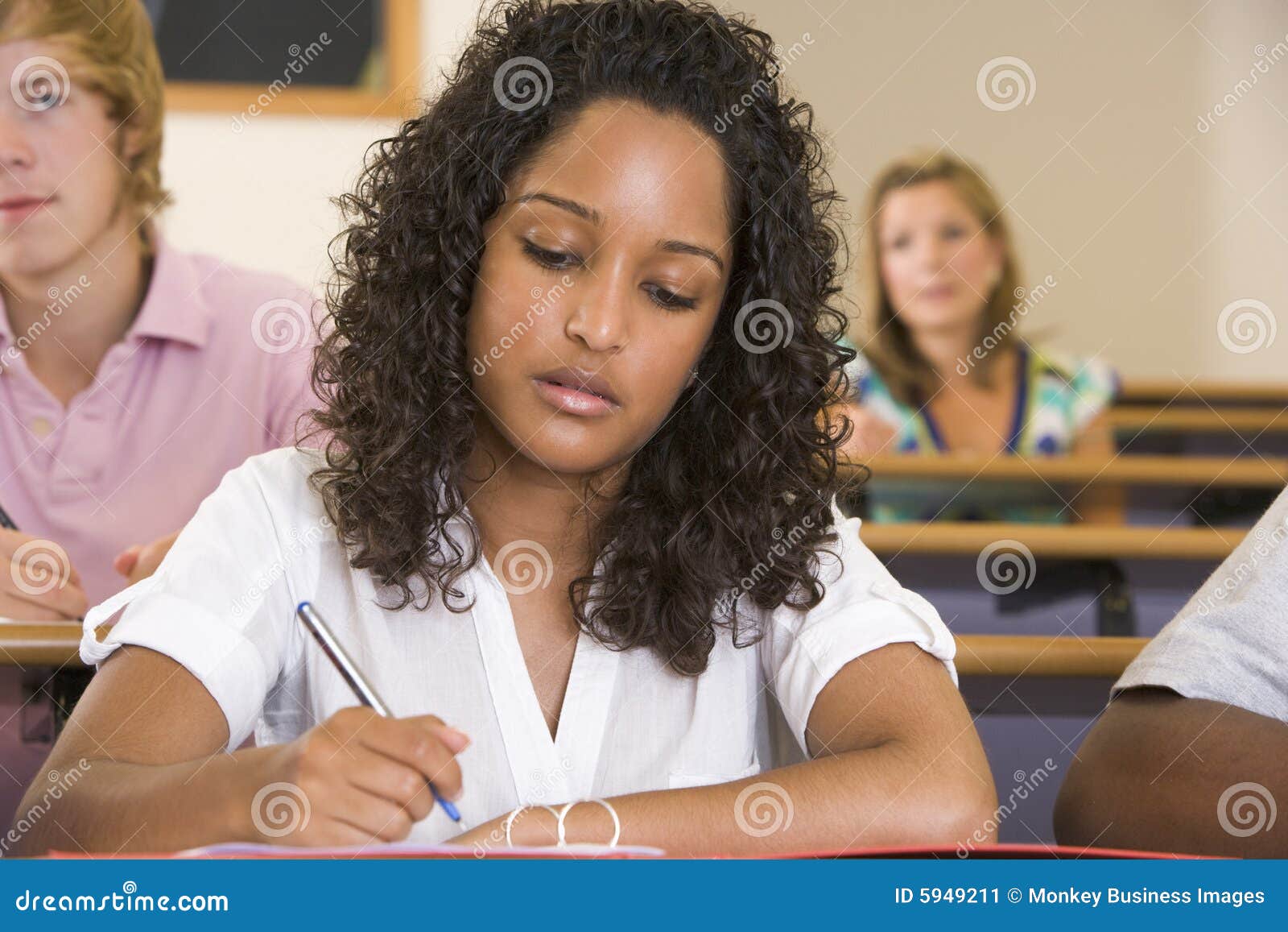 Female College Student Listening To a Lecture Stock Image - Image of ...
