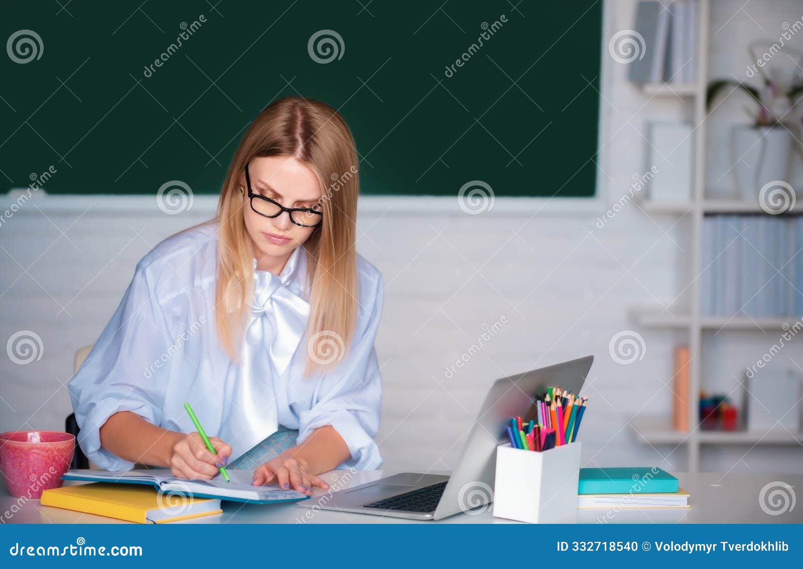 Female College Student Preparing for Test or Exam, Writing, Using ...