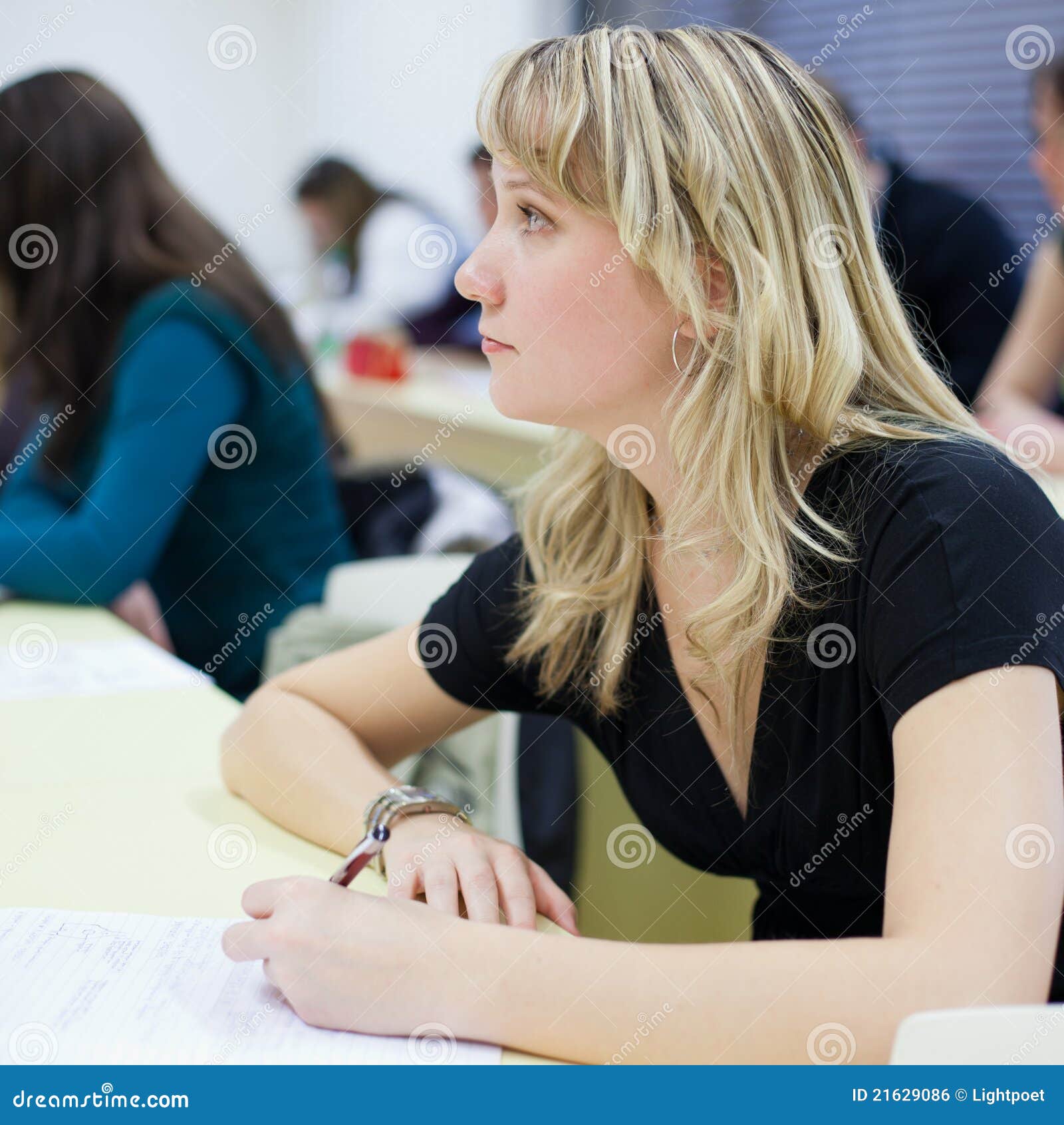 Female College Student Sitting in a Classroom Stock Photo - Image of ...