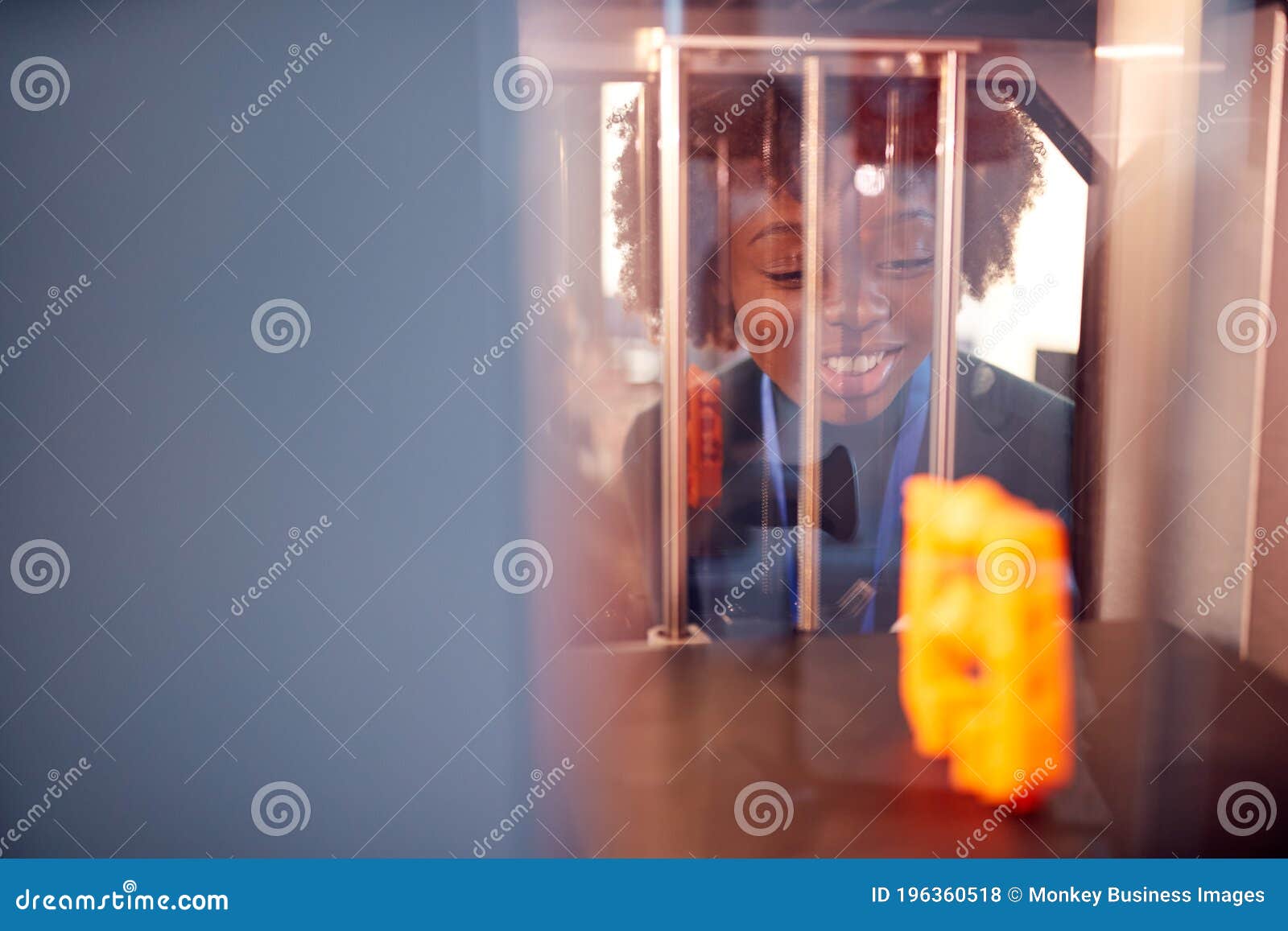 Female College Student Studying Engineering Using 3D Printing Machine ...
