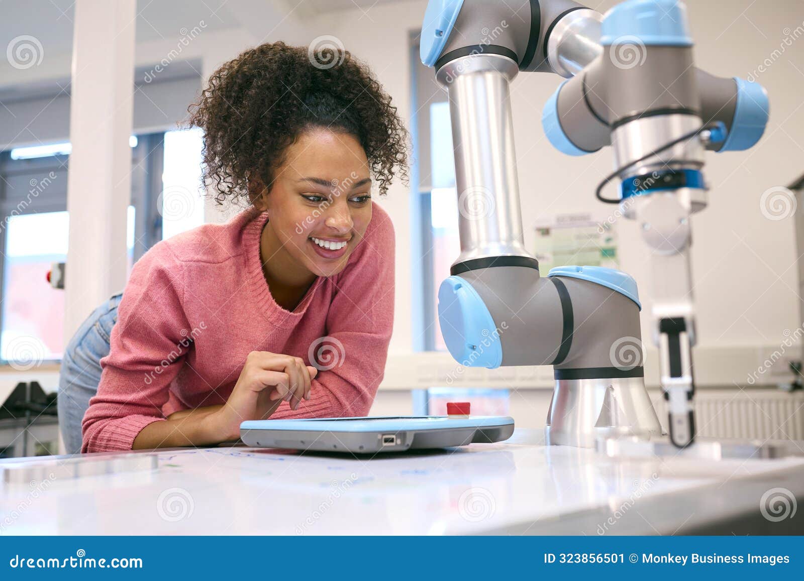 Female College or University Engineering Student in Robotics Class ...