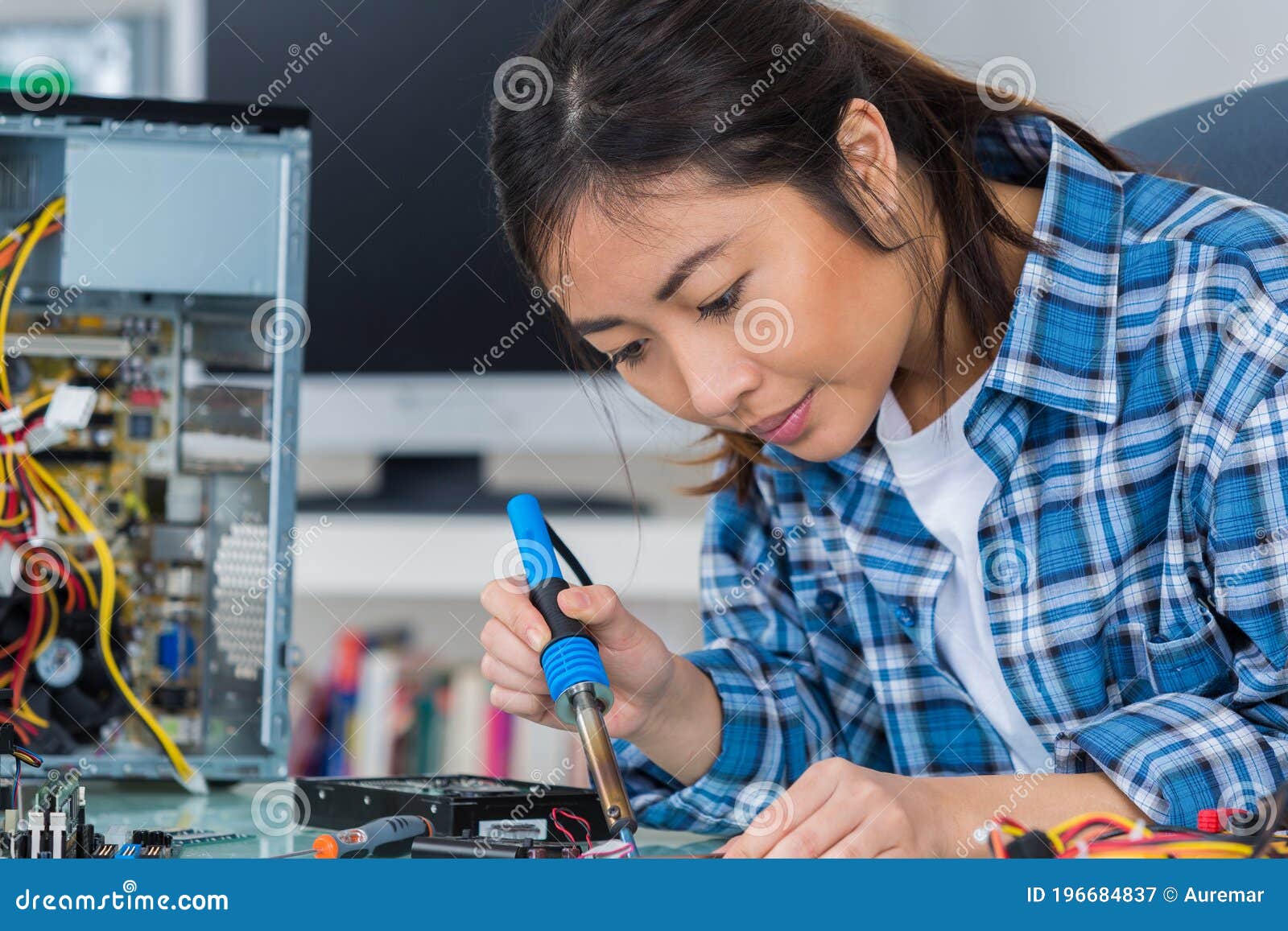 Female Computer Technician Using Soldering Iron Stock Image - Image of ...