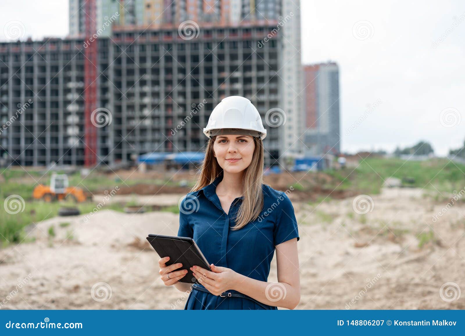 Female Construction Engineer. Architect with a Tablet Computer at a ...