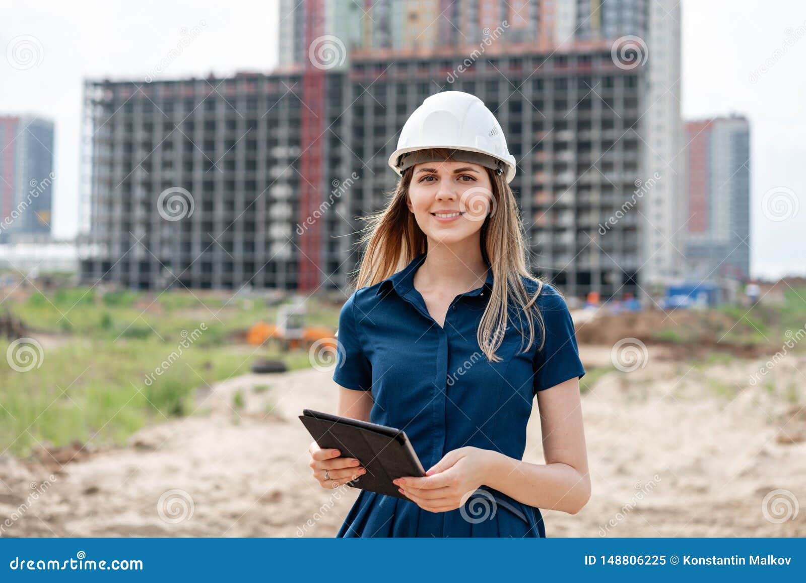 Female Construction Engineer. Architect with a Tablet Computer at a ...