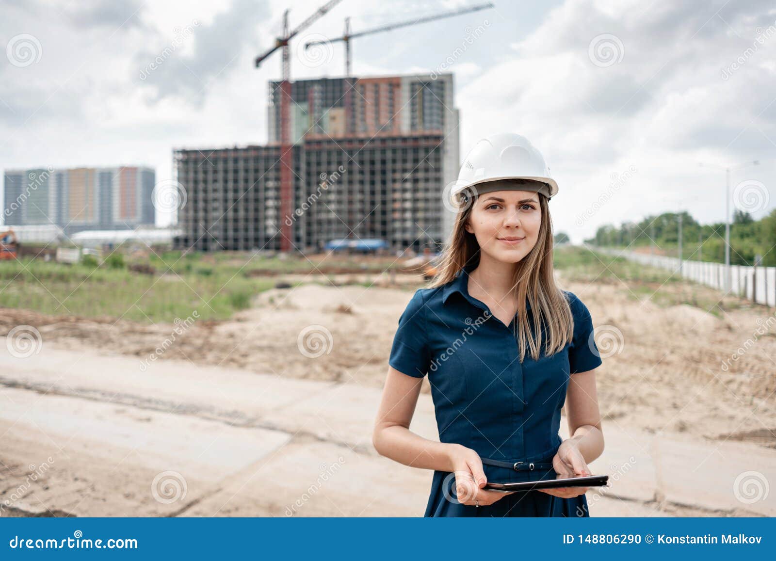 Female Construction Engineer. Architect with a Tablet Computer at a ...