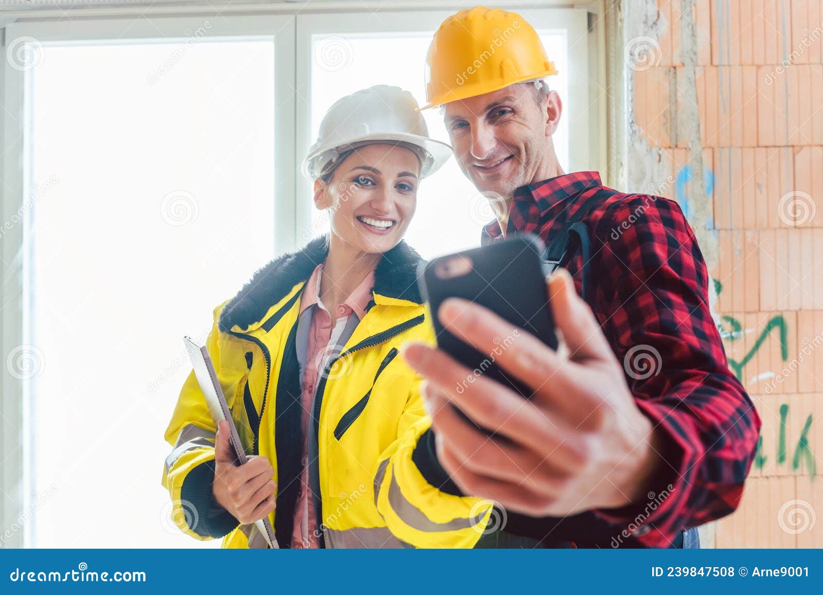 Female Construction Engineer and Male Worker Taking Selfie Stock Photo - Image of mobile ...