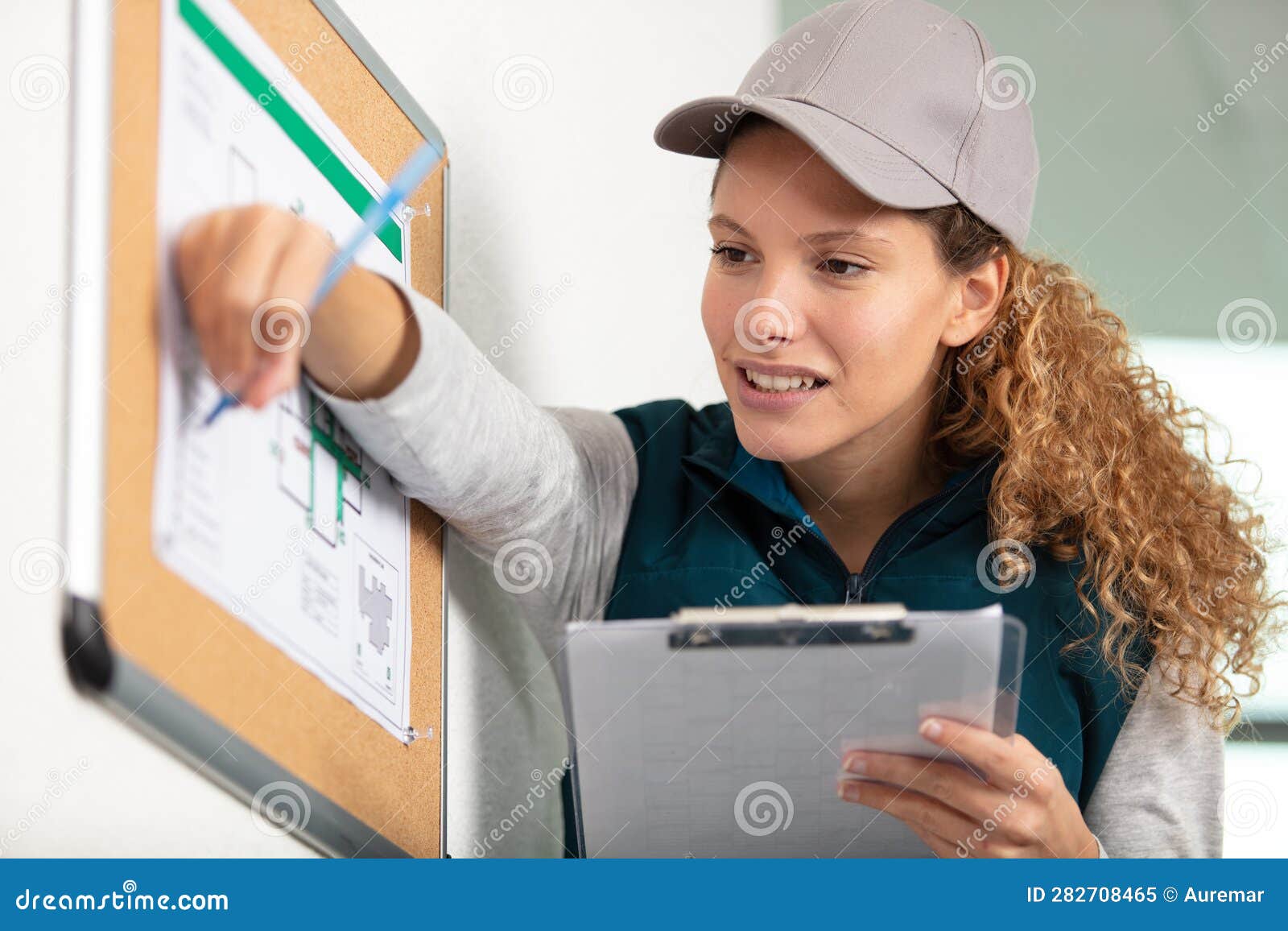 Female Construction Inspector Taking Notes on Clipboard Stock Image ...