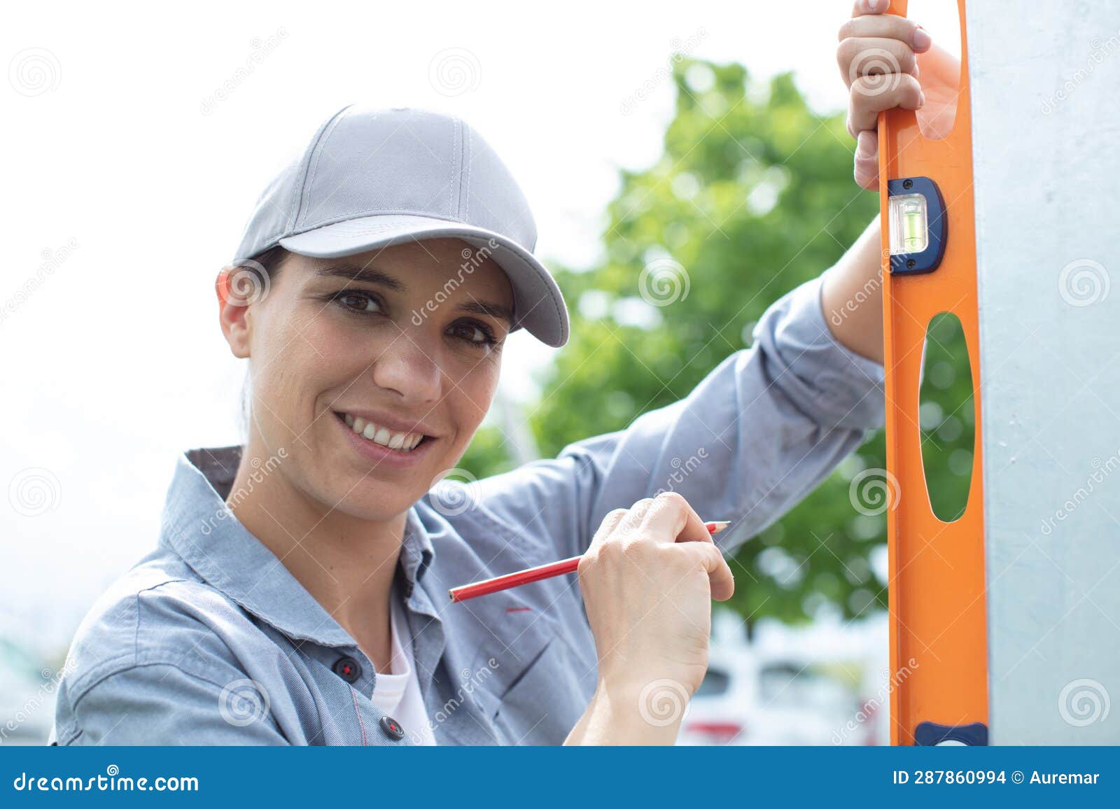 Female Construction Worker Checking Vertical Level Wall Stock Photo ...
