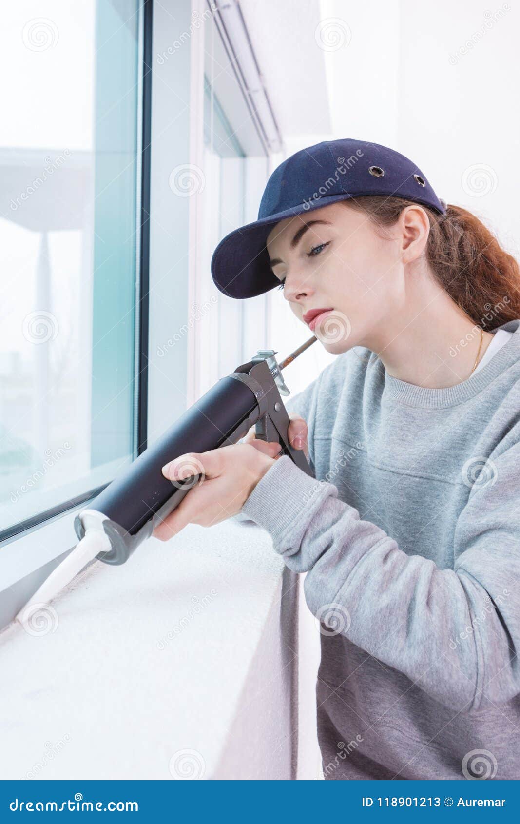 Female Construction Worker Installing Window in House Stock Image ...