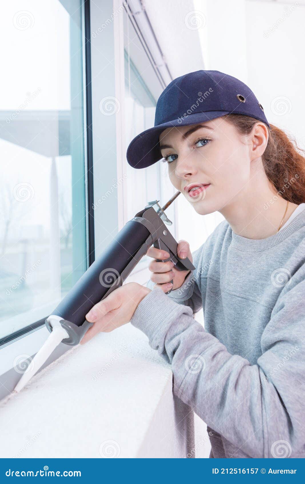 Female Construction Worker Installing Window in House Stock Image ...