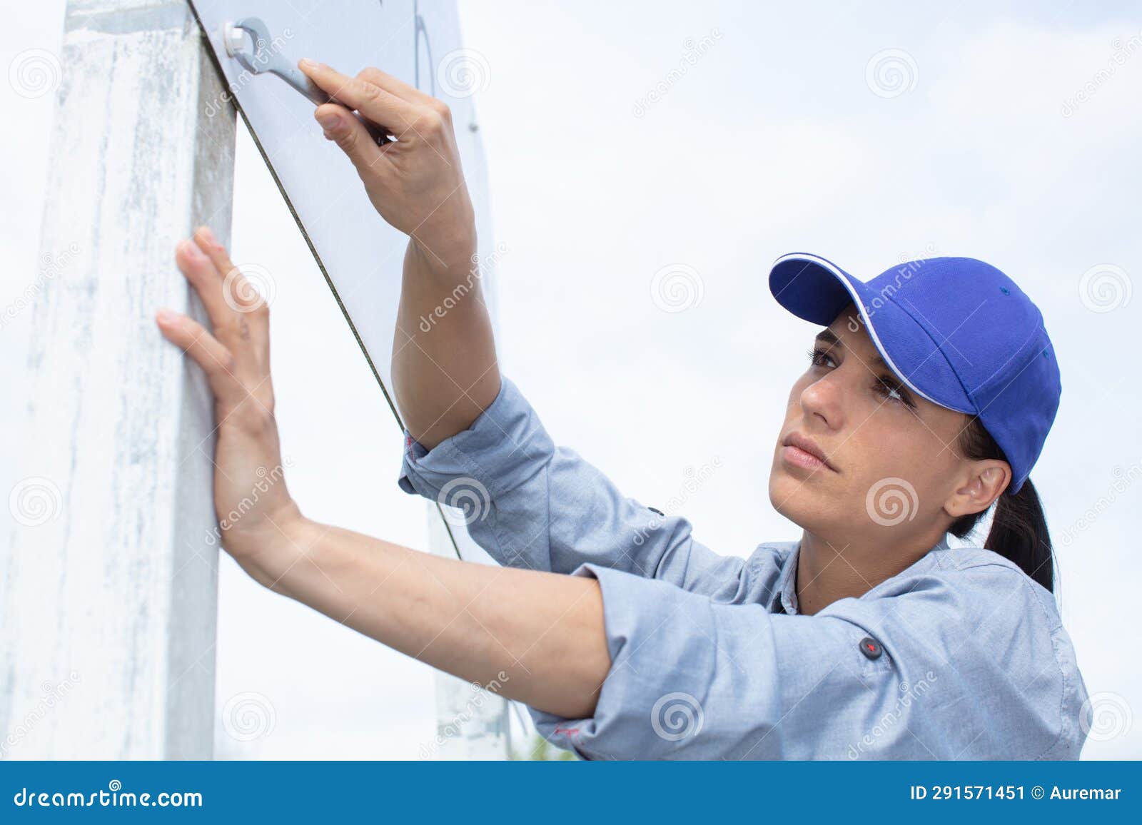 Female Constructon Worker Tightening Bolt with Spanner Stock Image ...
