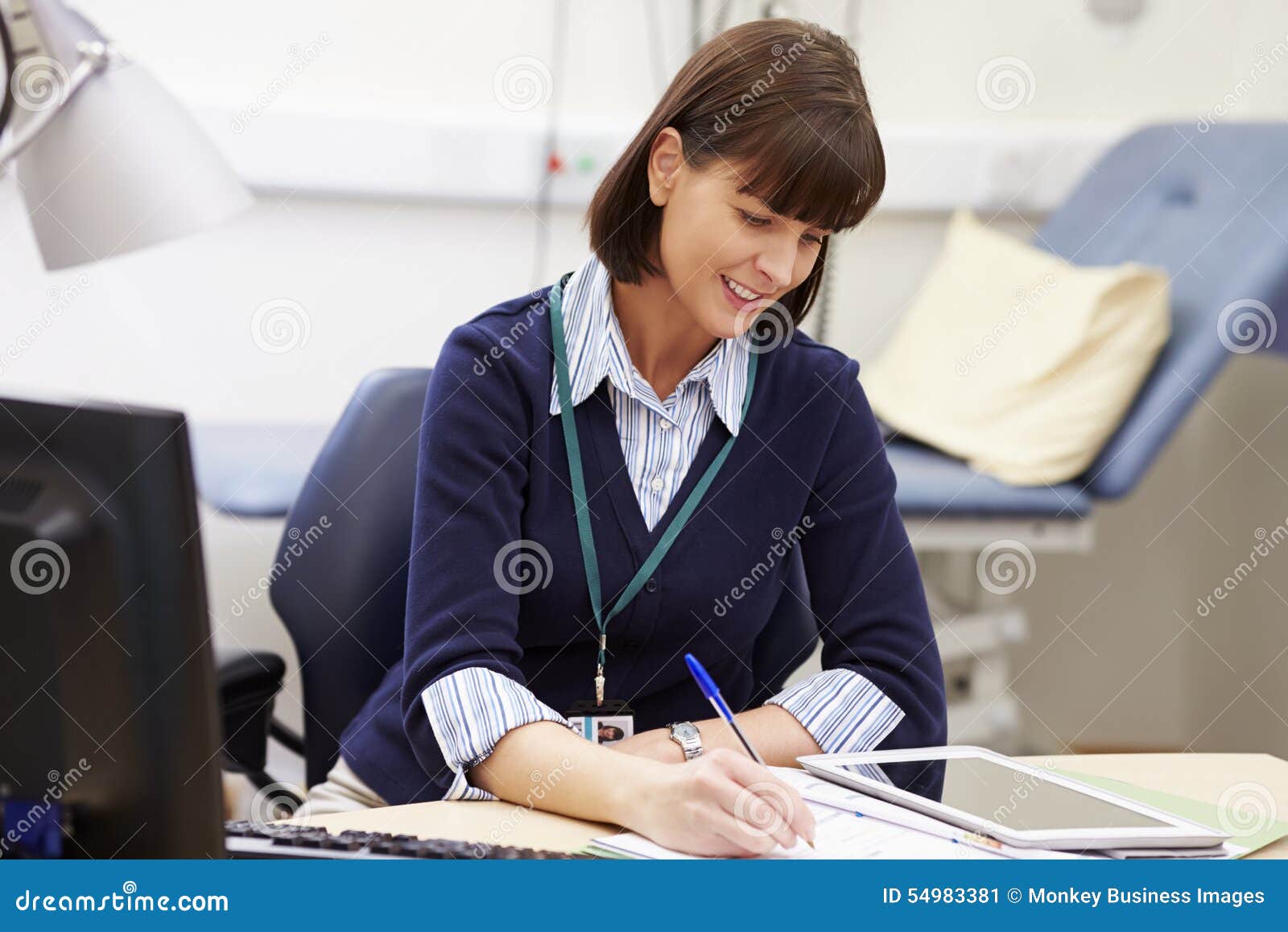Female Consultant Working at Desk in Office Stock Image - Image of card ...
