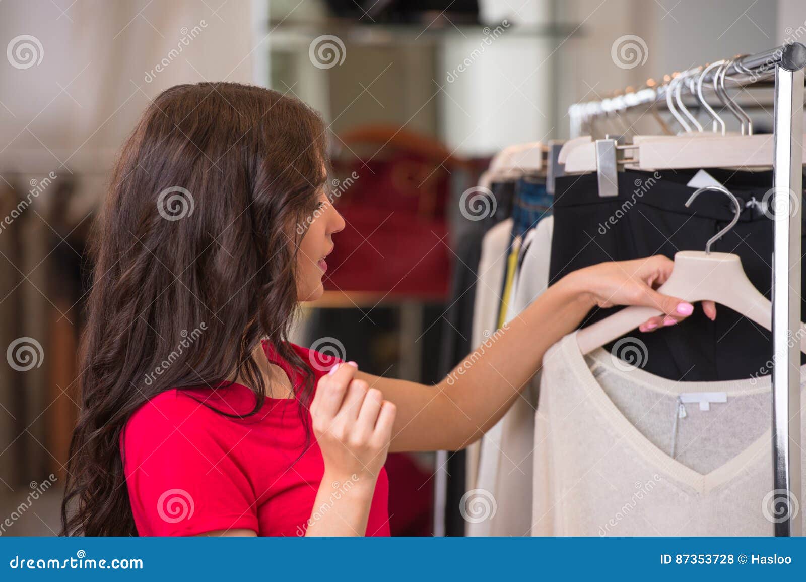 A Female Consumer Shopping in an Clothes Store Stock Photo - Image of ...