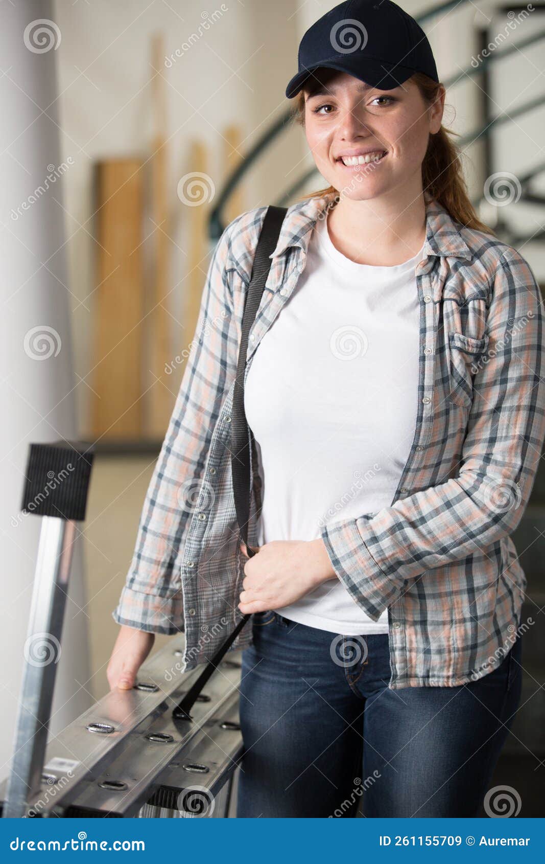 Female Contractor Carrying Ladder Stock Image - Image of indoors ...