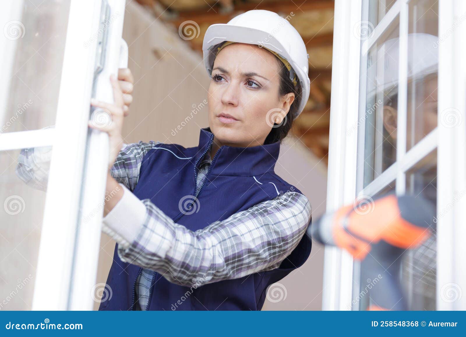 Female Contractor Installing Windows Stock Photo - Image of work, woman ...