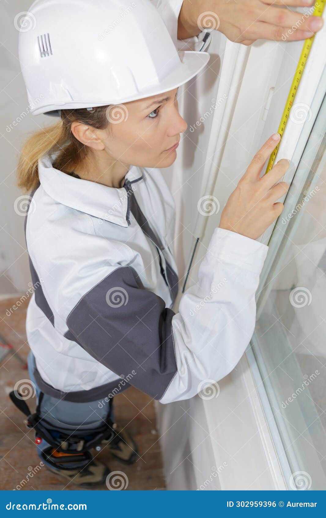 Female Contractor Measuring Window Stock Photo - Image of measure ...