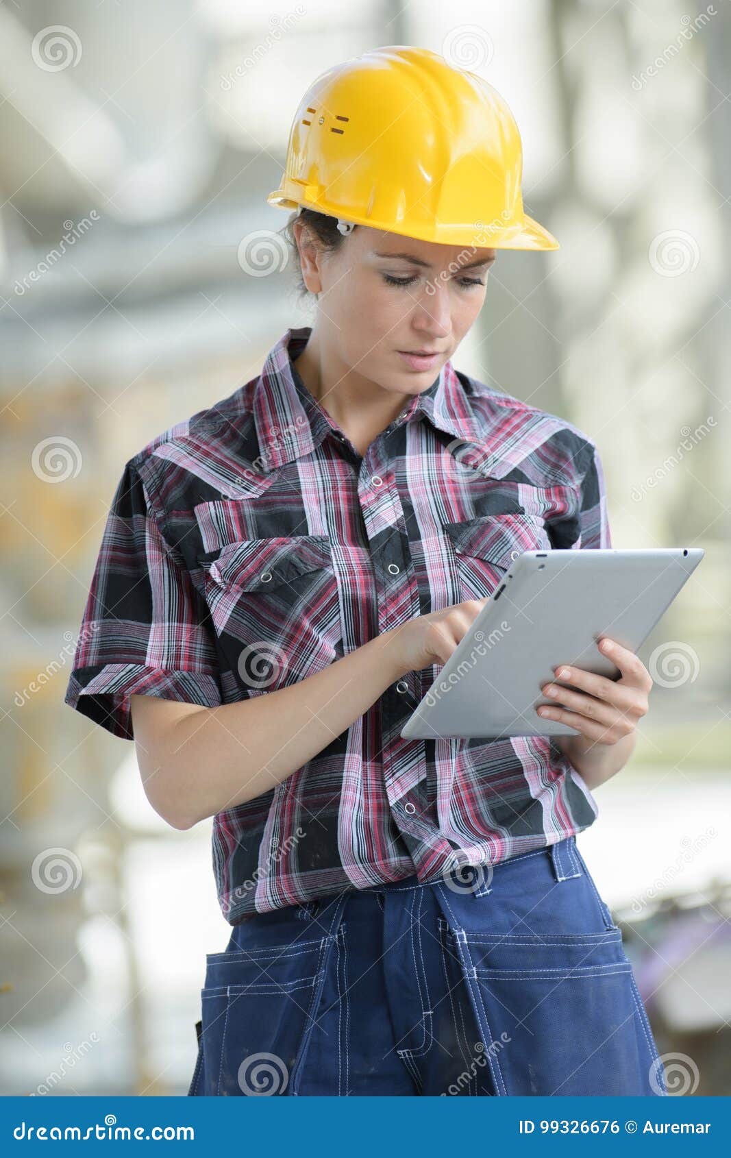 Female Contractor at Work Site Using Ipadtablet Stock Photo - Image of ...