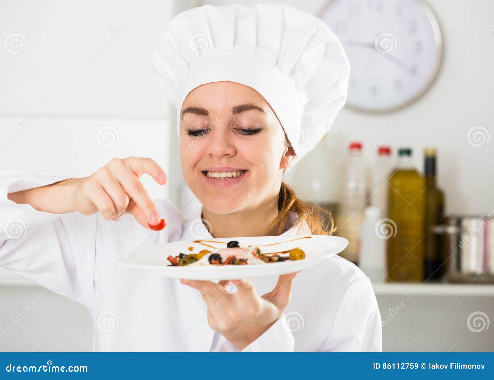Female cook preparing food stock image. Image of profession - 86112759