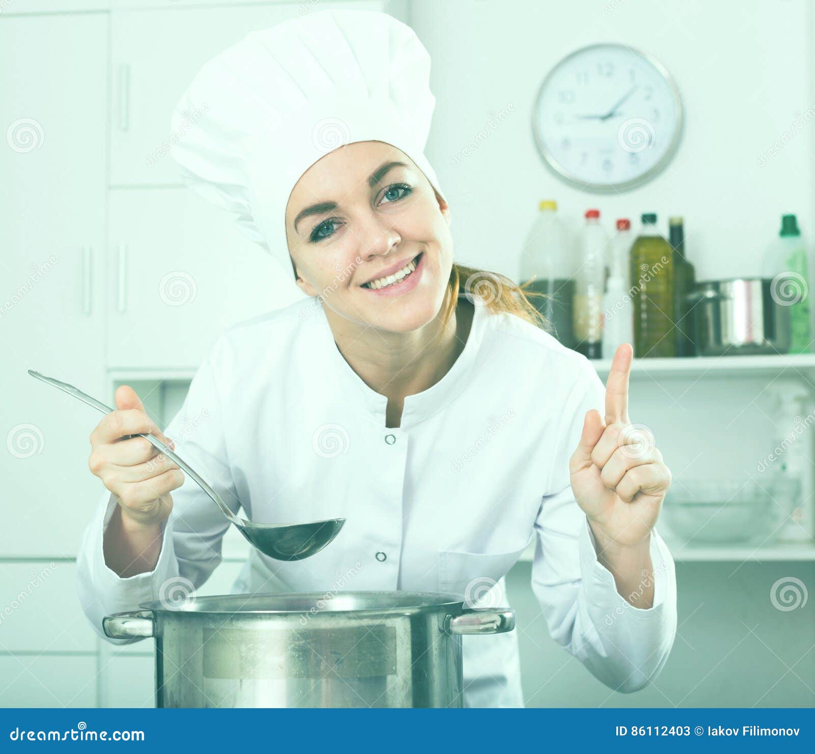 Female cook tasting food stock image. Image of european - 86112403