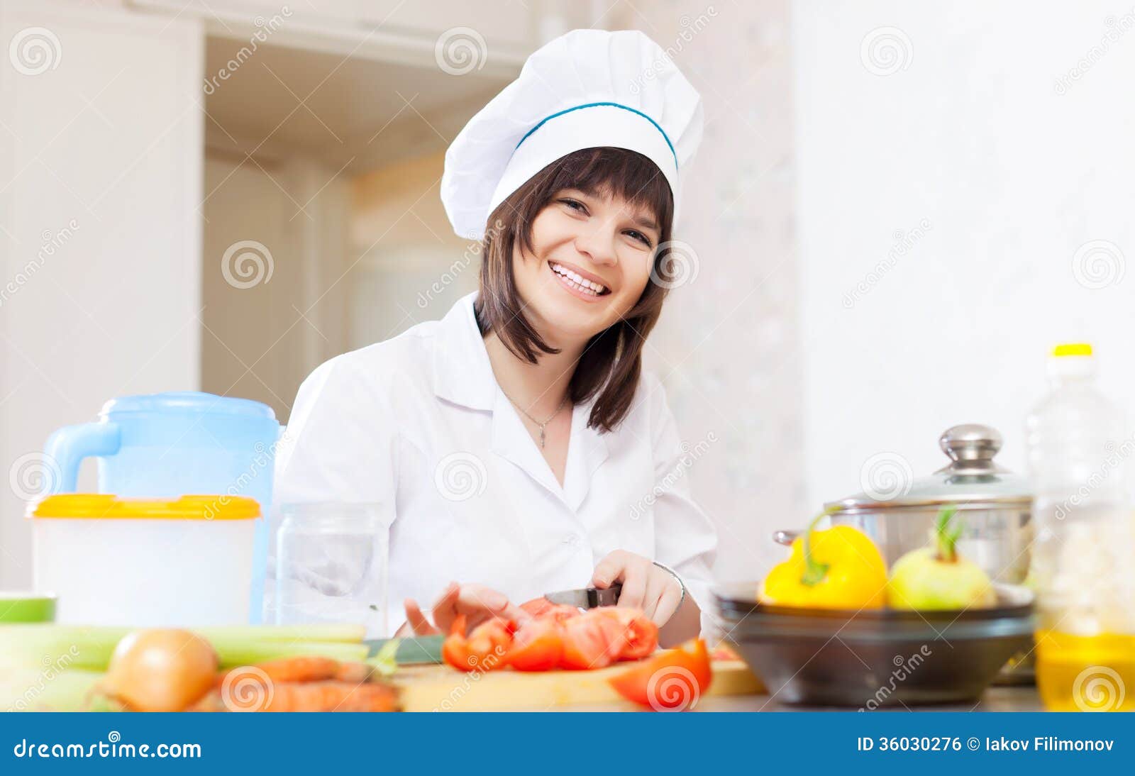 Female Cook in Toque with Vegetables Stock Photo - Image of cook, knife ...