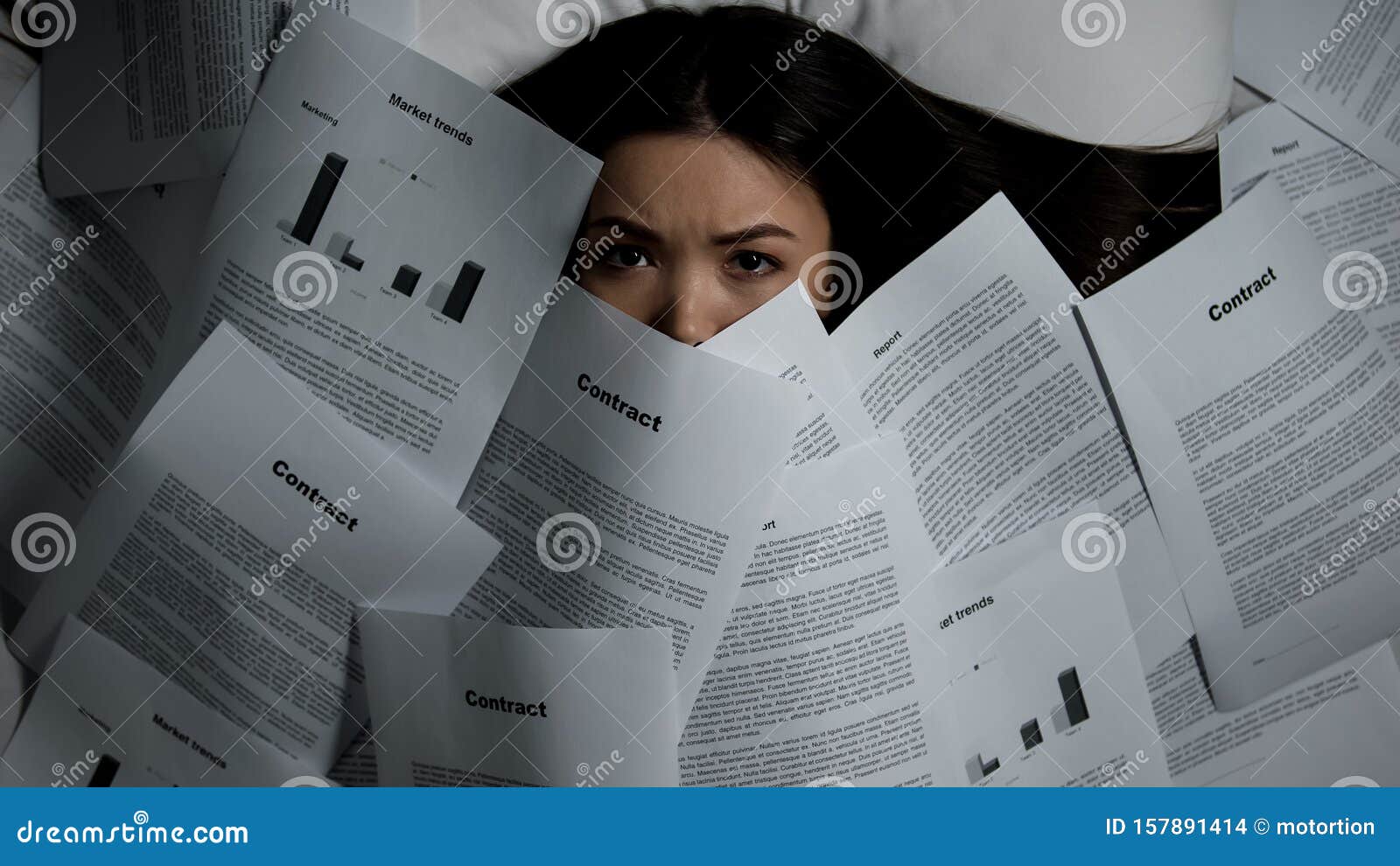 Female Covered with Pile of Documents Lying in Bed, Work Overload ...
