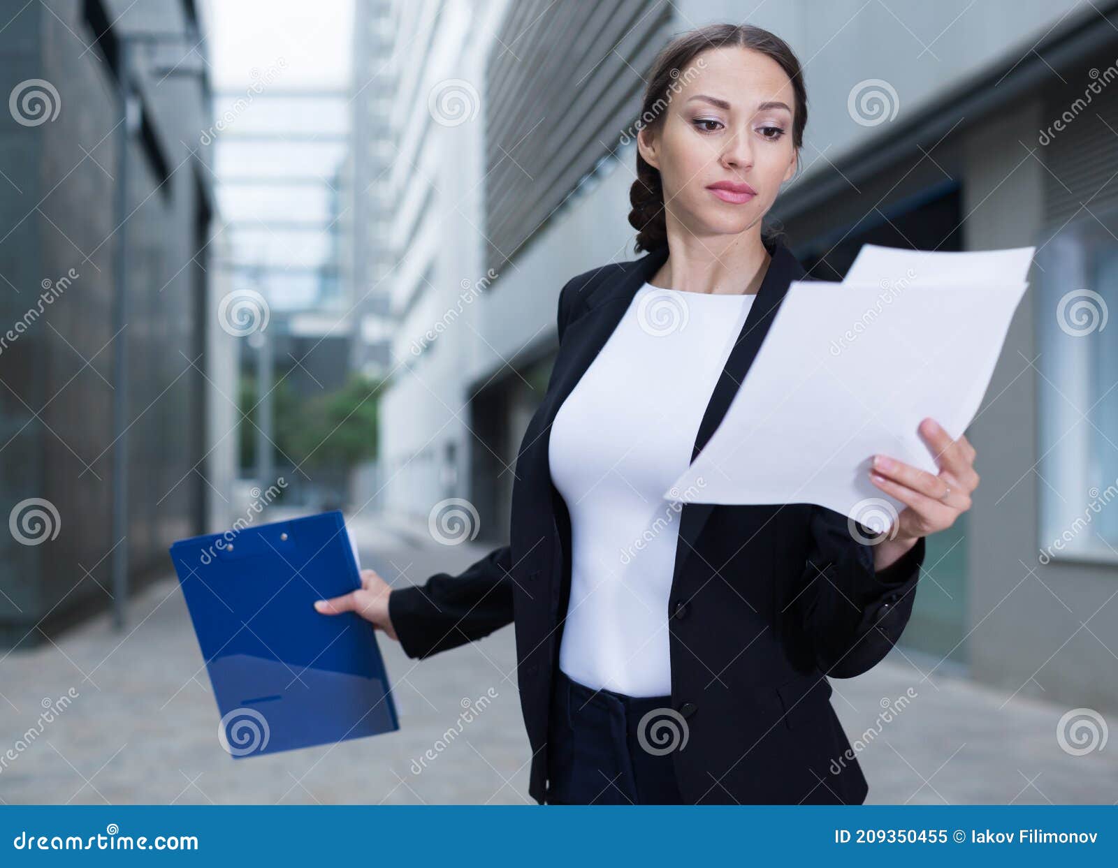 Female Creative Director is Examining Documents Stock Image - Image of ...