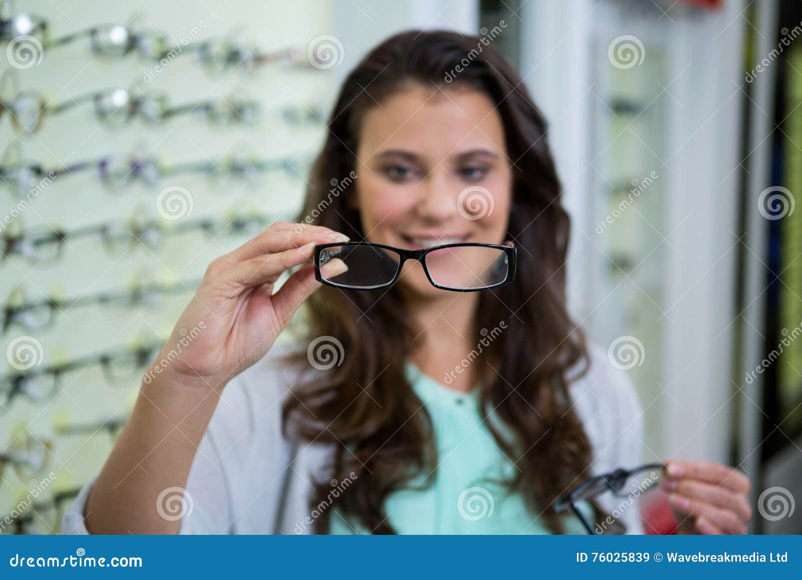 Female Customer Choosing Spectacles in Optical Store Stock Image ...
