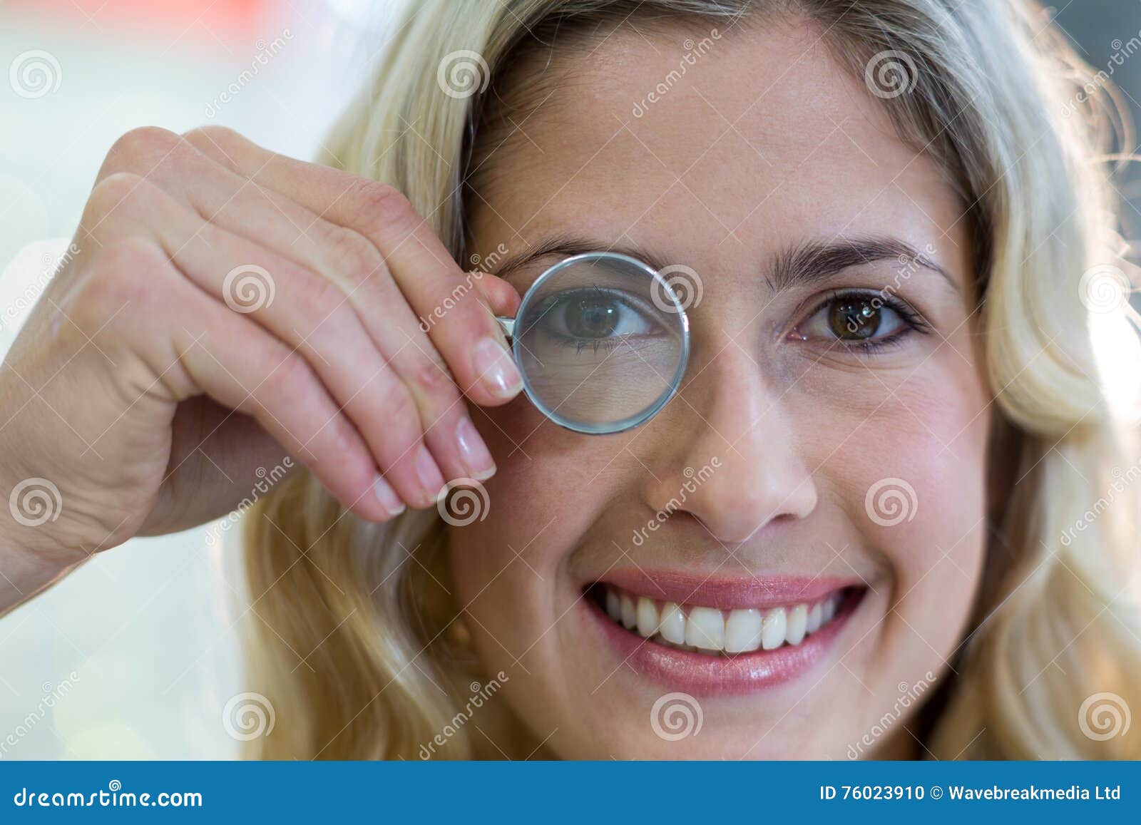 Female Customer Looking through Magnifying Glass Stock Photo - Image of ...