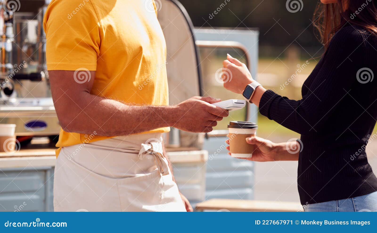 Female Customer Making Contactless Payment Using Smart Watch at Mobile ...