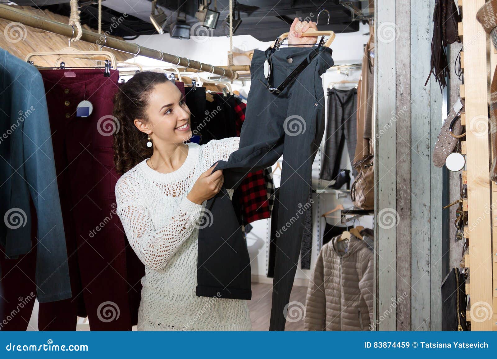 Female Customer Selecting New Garments Stock Image Image Of Brunette