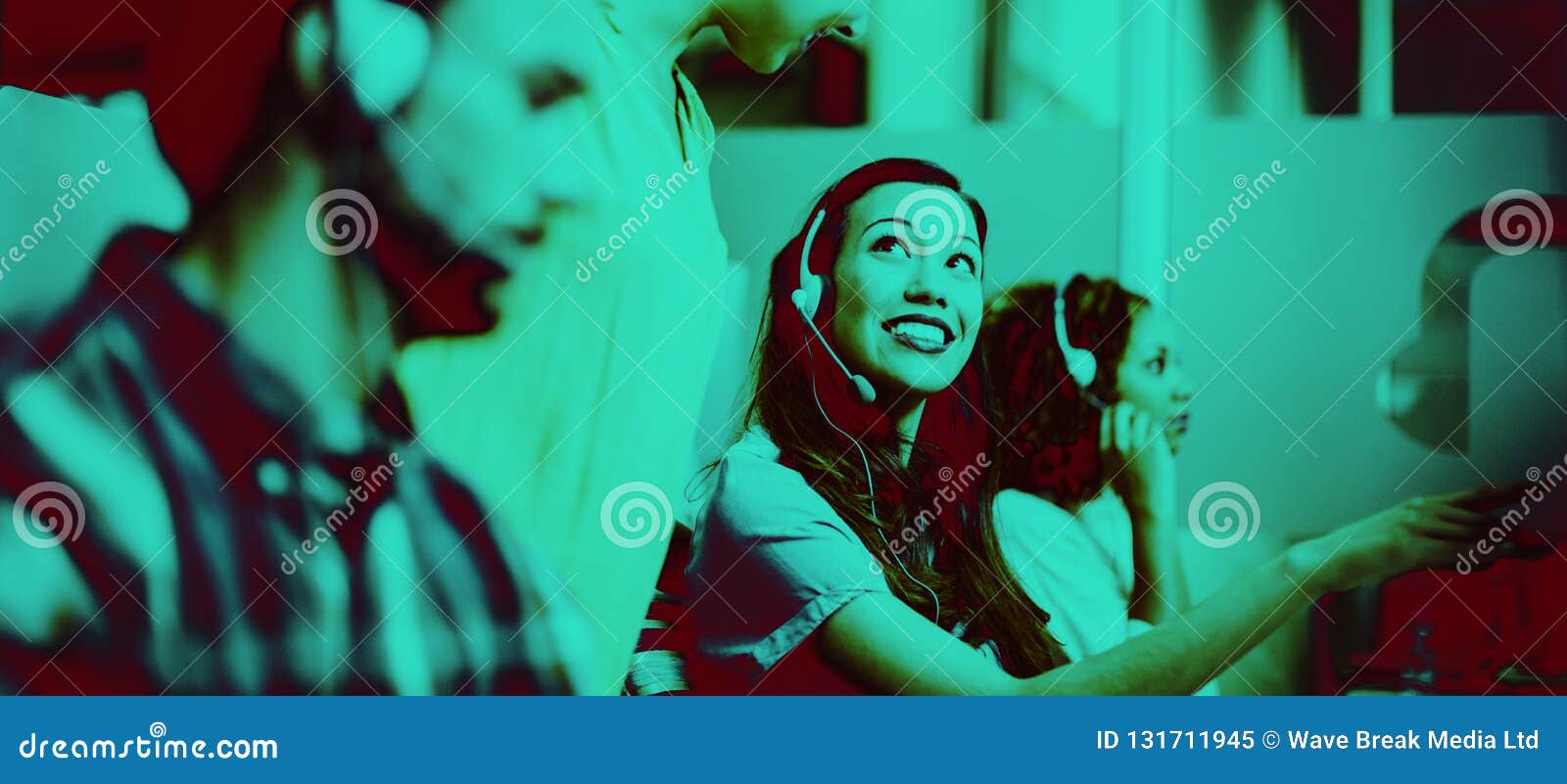 Female Customer Service Executive Interacting with Her Colleague at ... Female Customer Service Executive Interacting with Her Colleague at ...