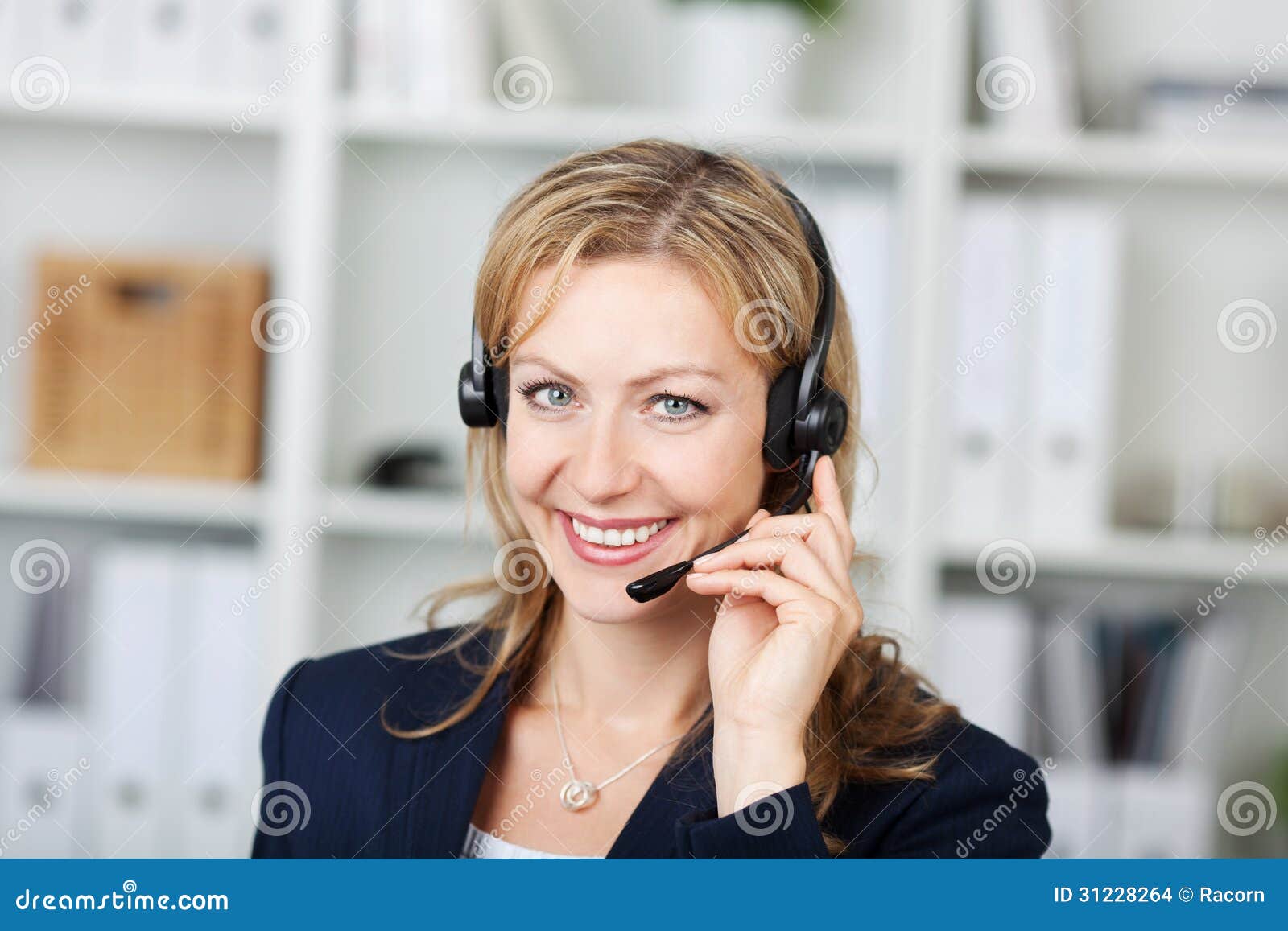Female Customer Service Operator Using Headset in Office Stock Photo ...