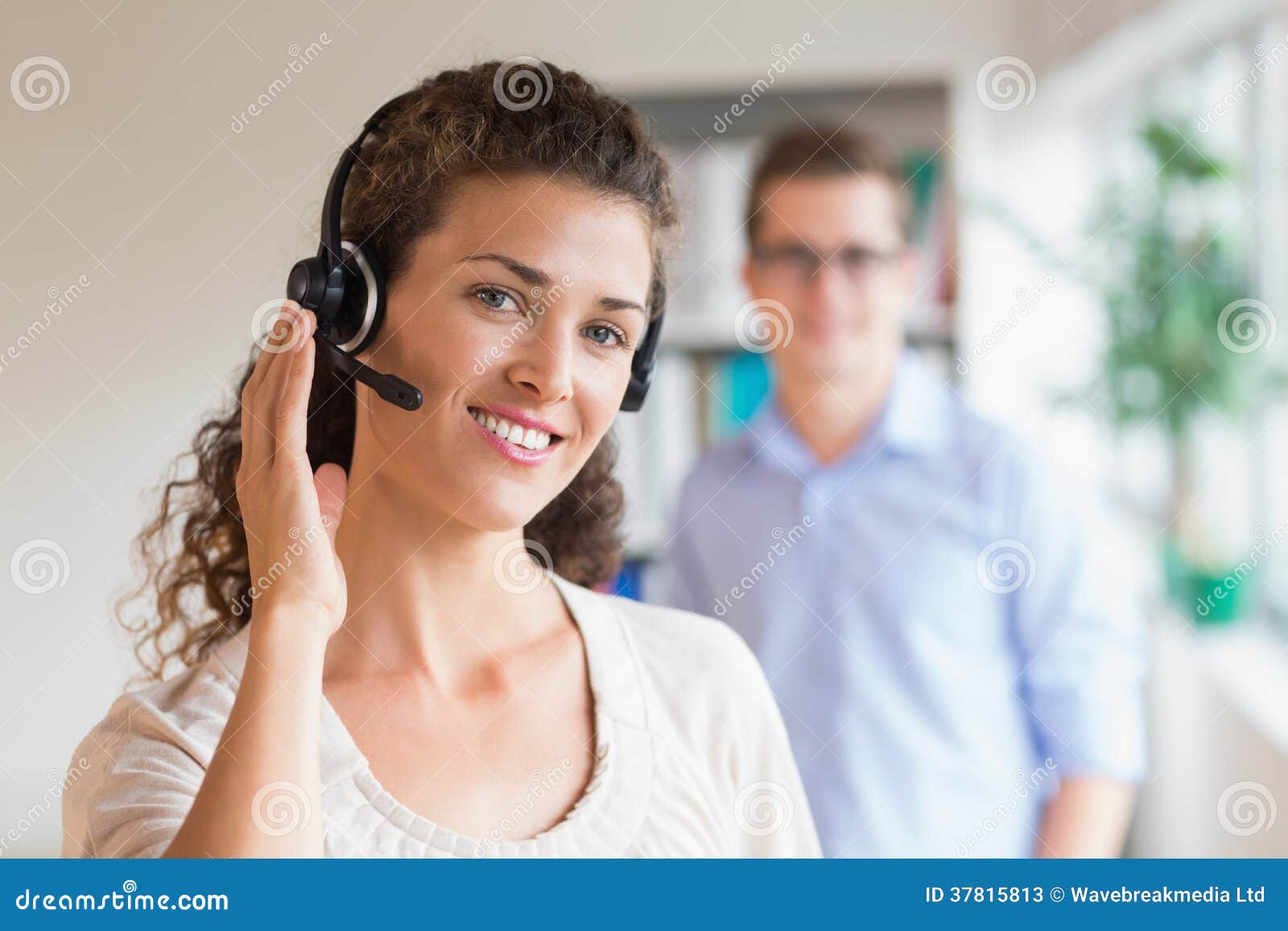 Female Customer Service Representative Wearing Headset Stock Image ...
