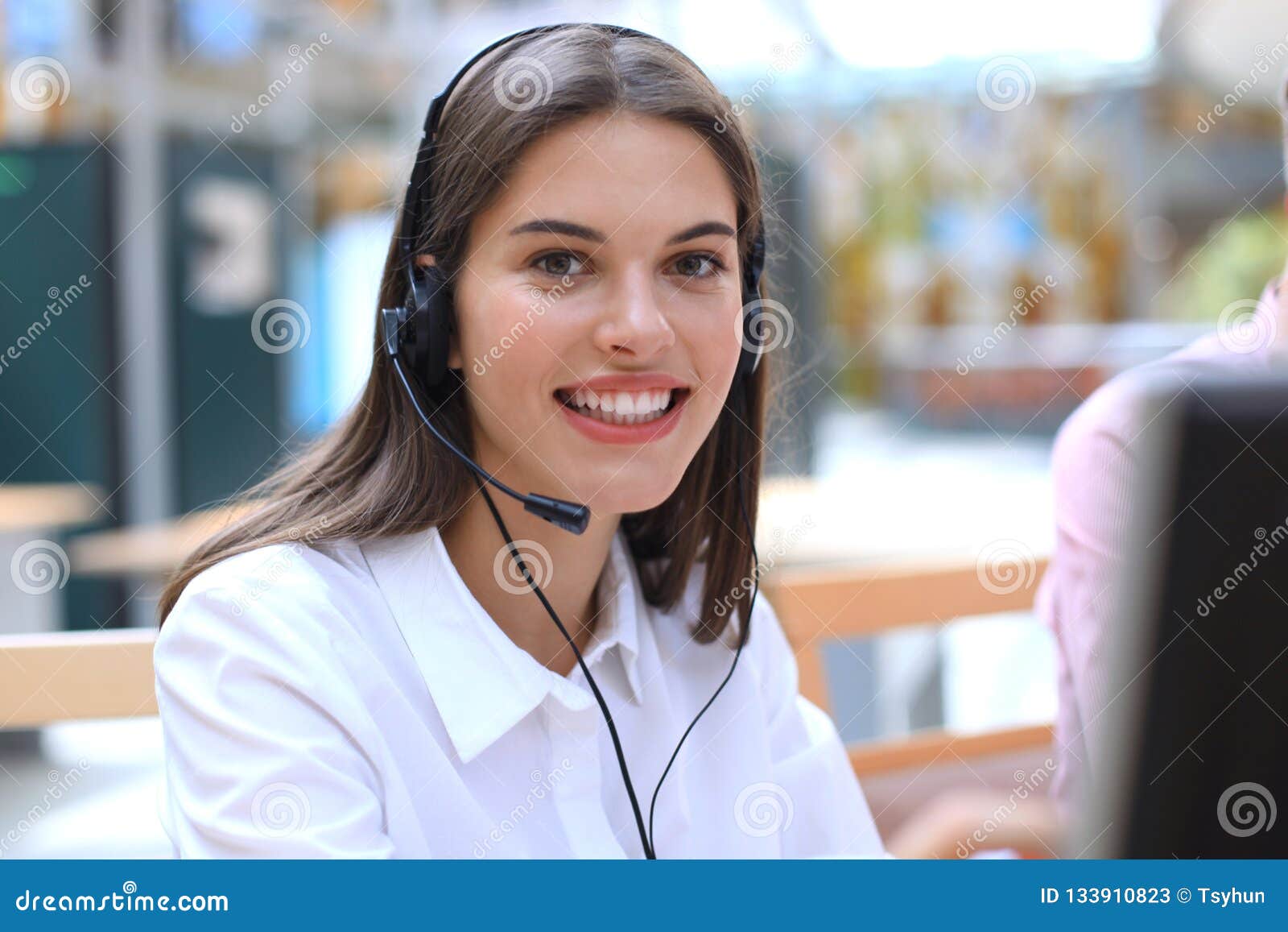 Female Customer Support Operator with Headset and Smiling. Stock Image ...