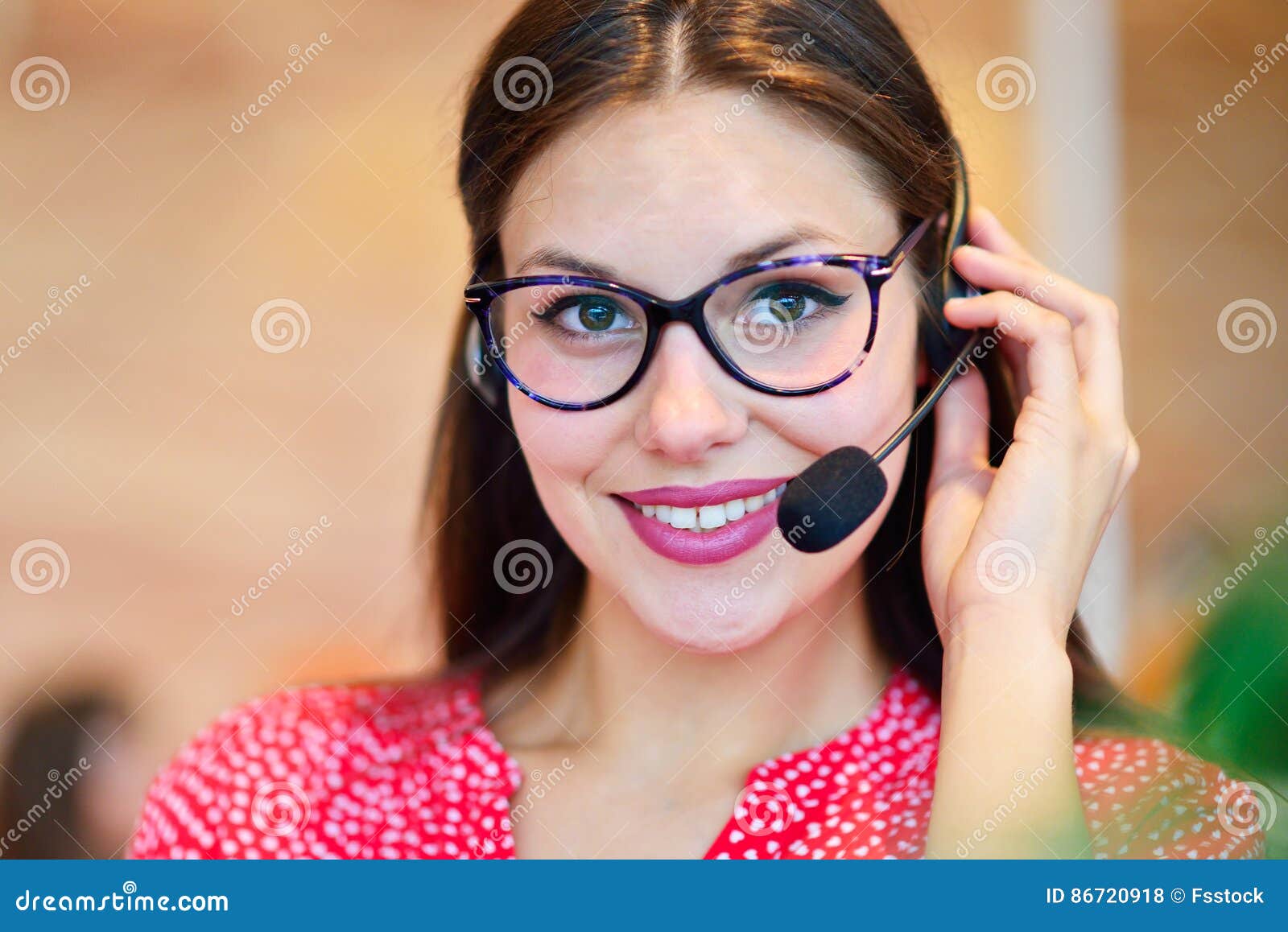 Female Customer Support Operator with Headset and Smiling Stock Photo ...