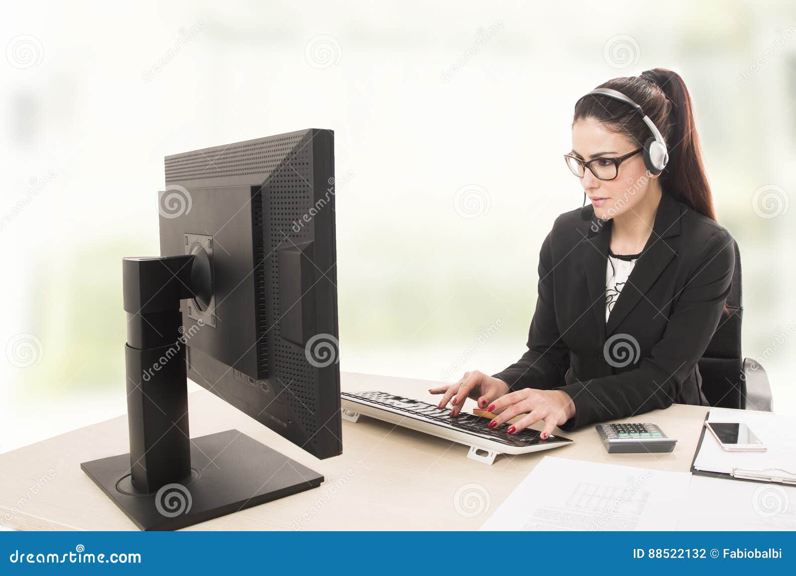 Female Customer Support Phone Operator at Workplace. Stock Photo ...