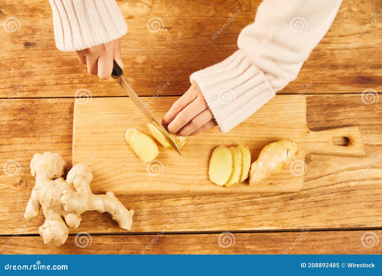 Female Cutting a Ginger on a Chopping Board Stock Image - Image of ...