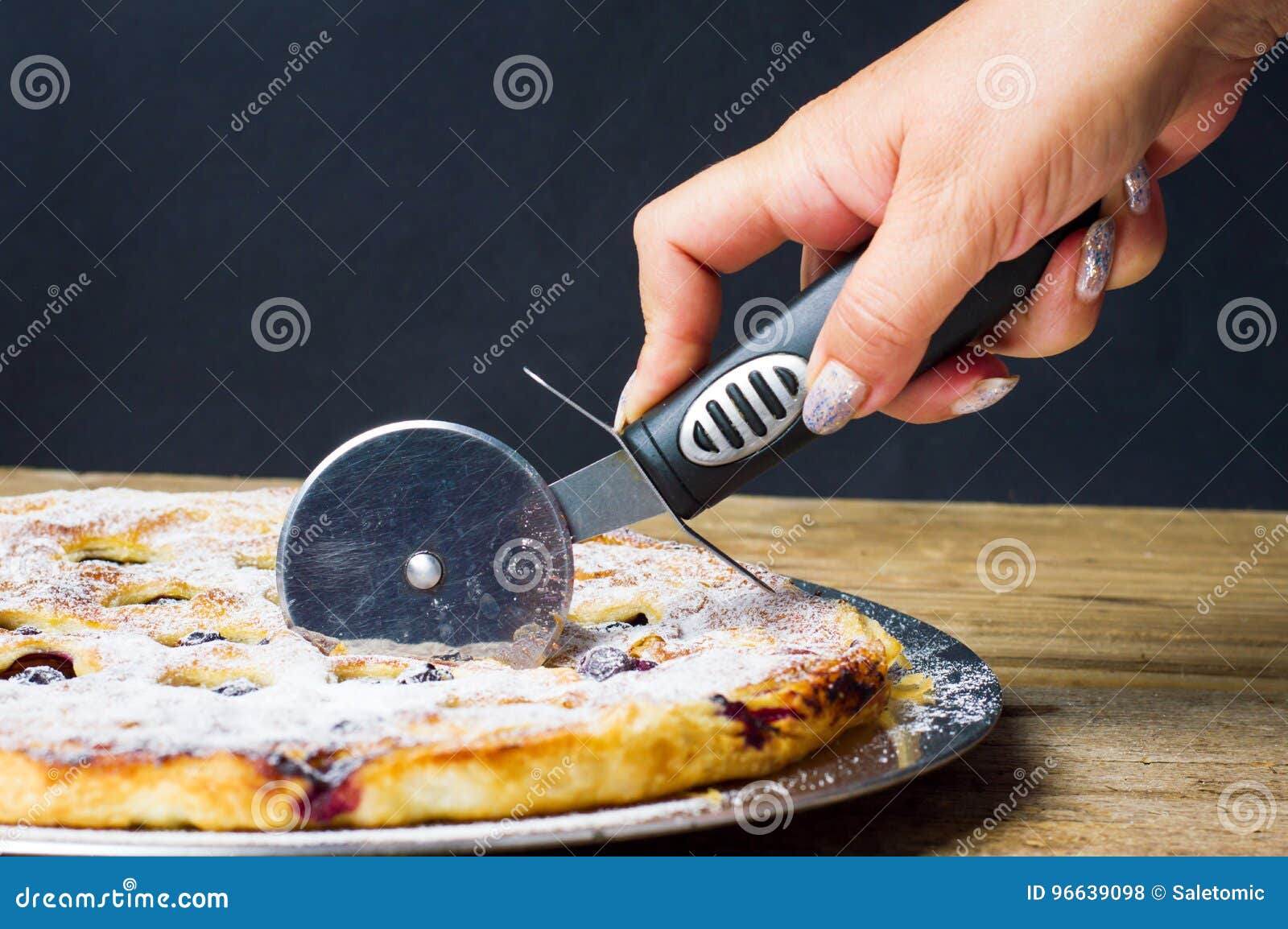 Female Cutting Sweet Pie with a Roller Cutter Stock Photo - Image of ...
