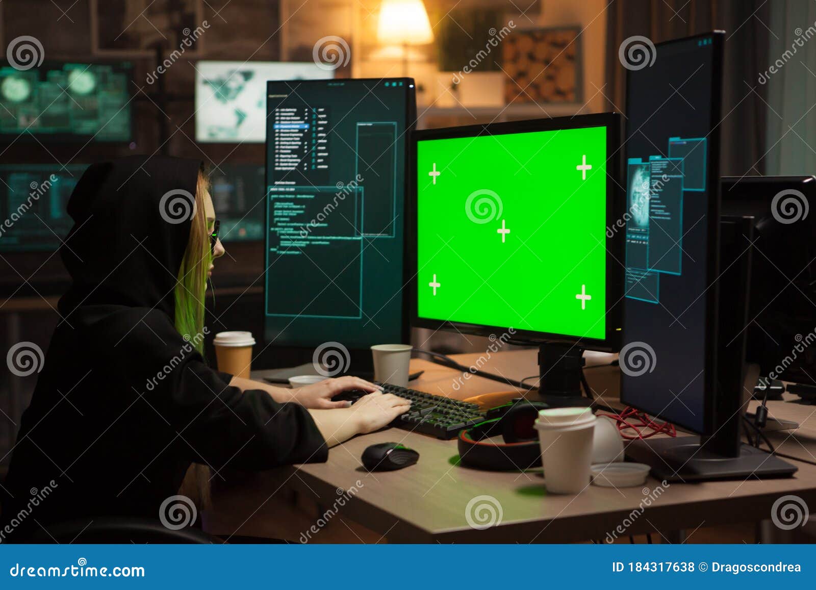 Female Cyber Criminal Typing on Computer with Green Screen Stock Photo ...