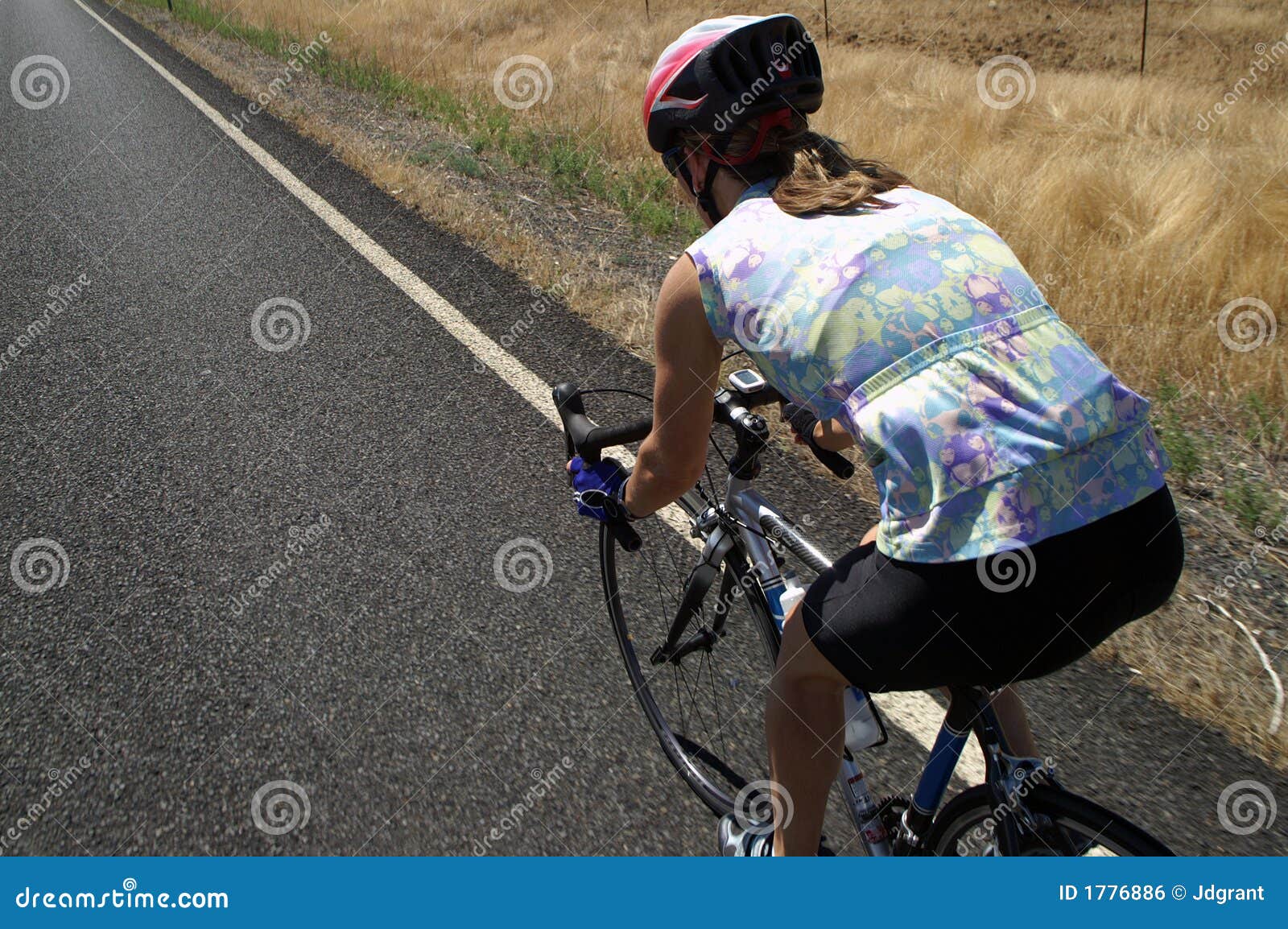 Female Cyclist on Country Road Stock Photo - Image of happiness, brave ...