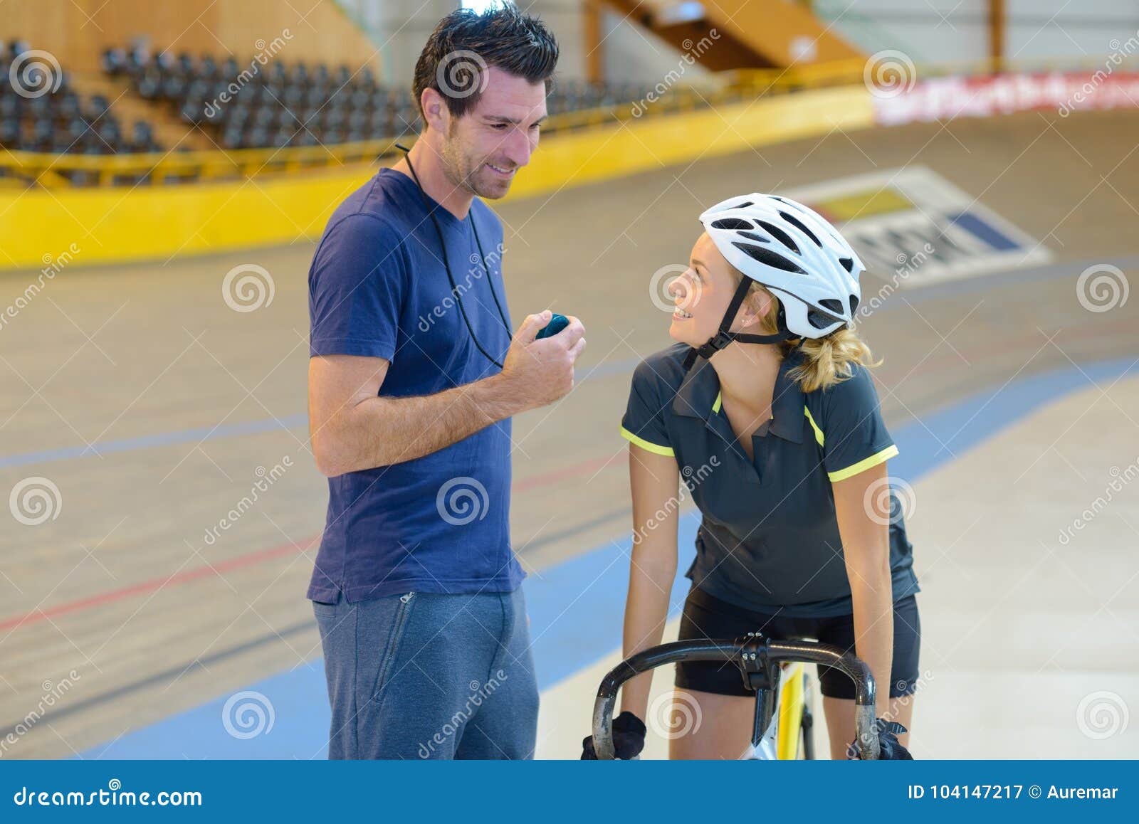 Female Cyclist Talking To Coach Stock Image - Image of track, person ...