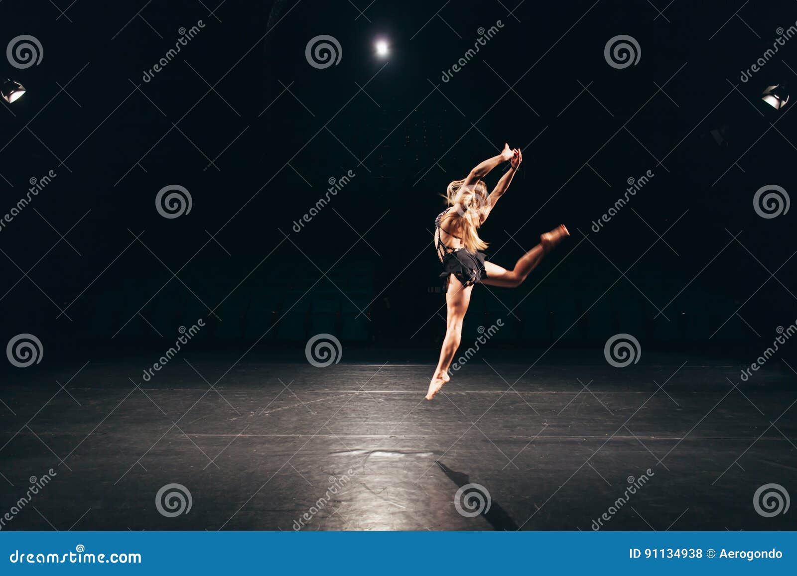Female Dancer Jumps on Empty Stage Stock Photo - Image of floor ...