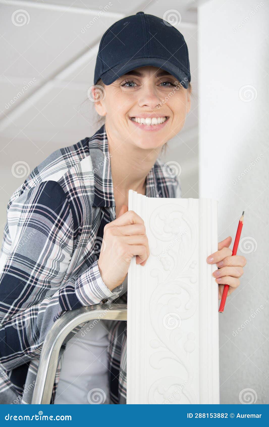 Female Decorator Holding Length Decorative Coving Stock Photo - Image ...