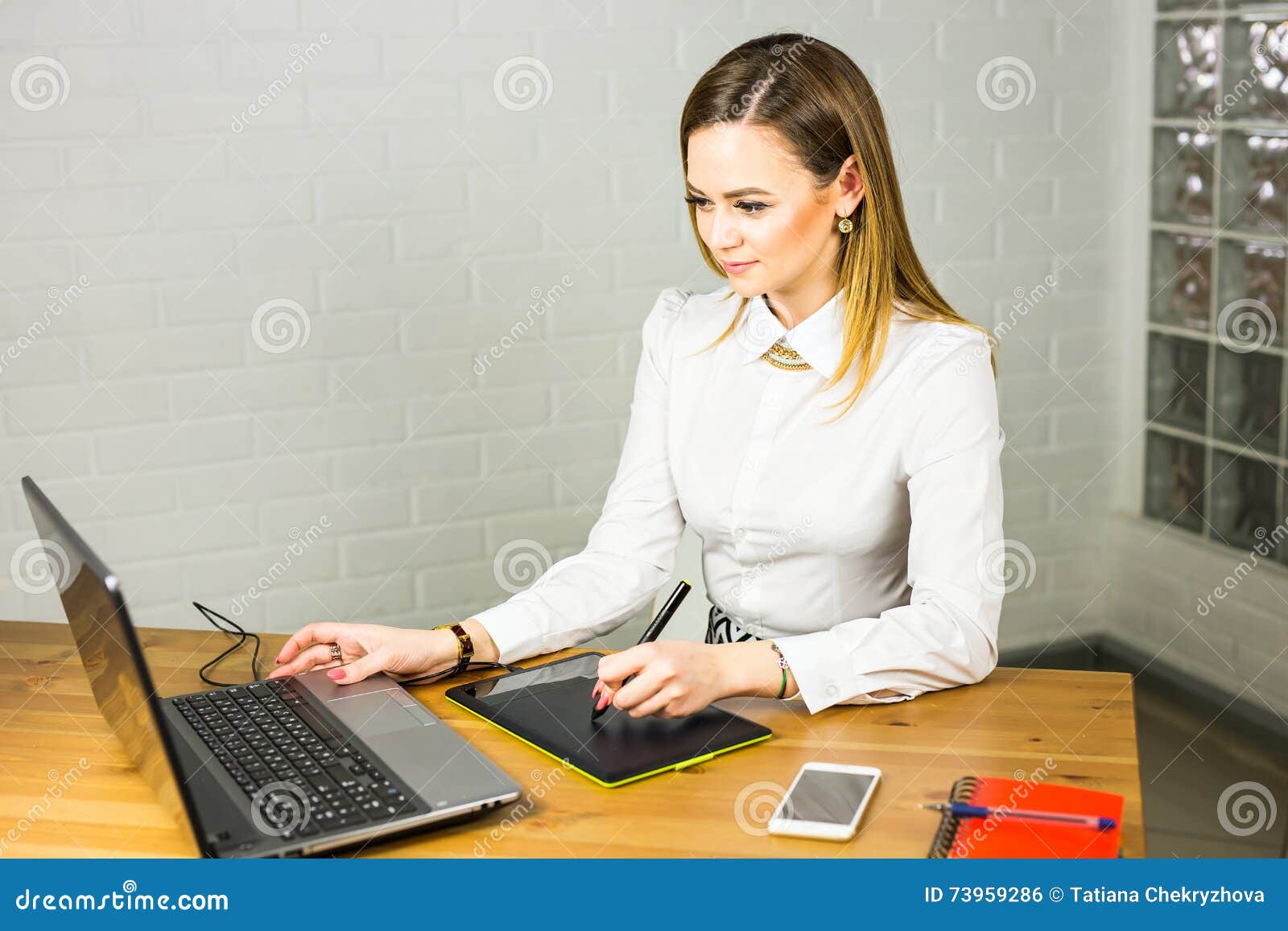 Female Designer In Office Working With Digital Graphic Tablet And