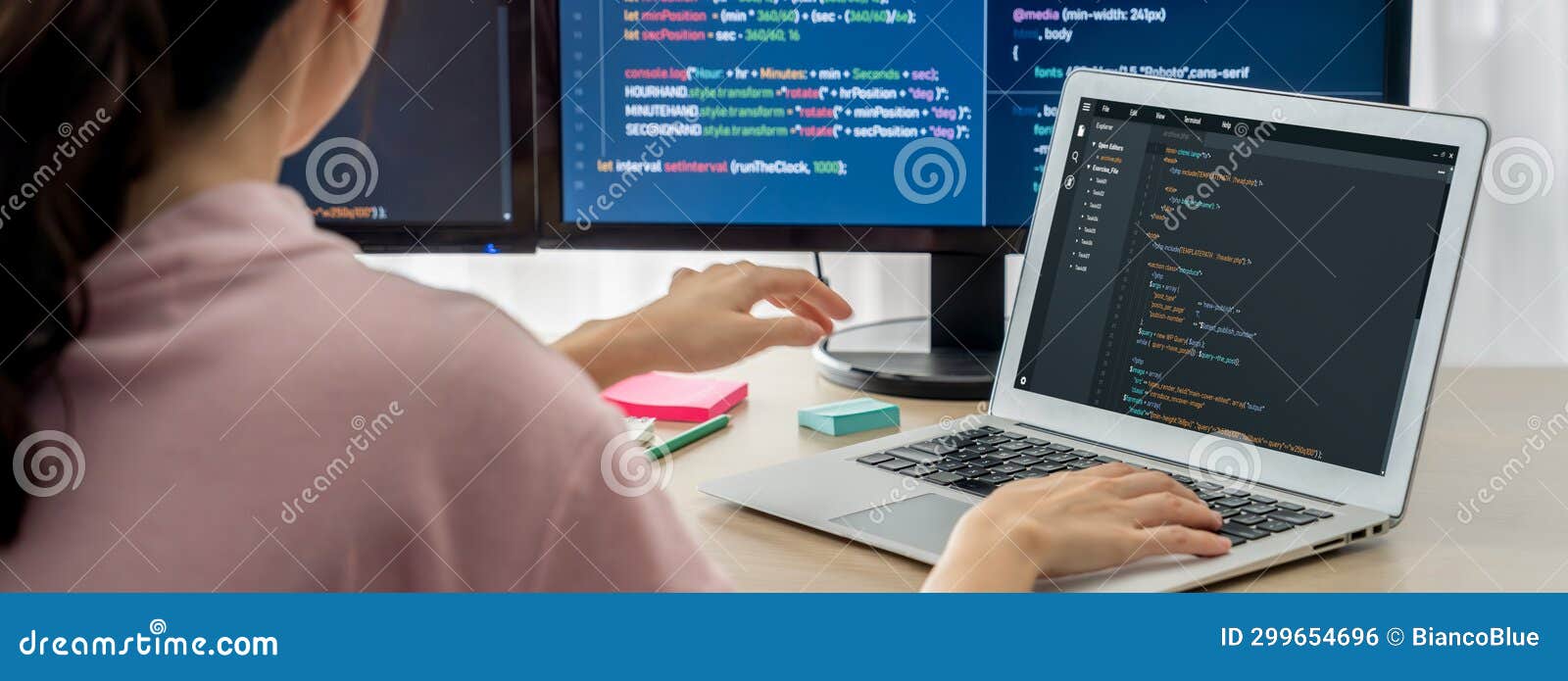 Female Developer Coding on Laptop while Computer Display Program. Burgeoning. Stock Photo ...