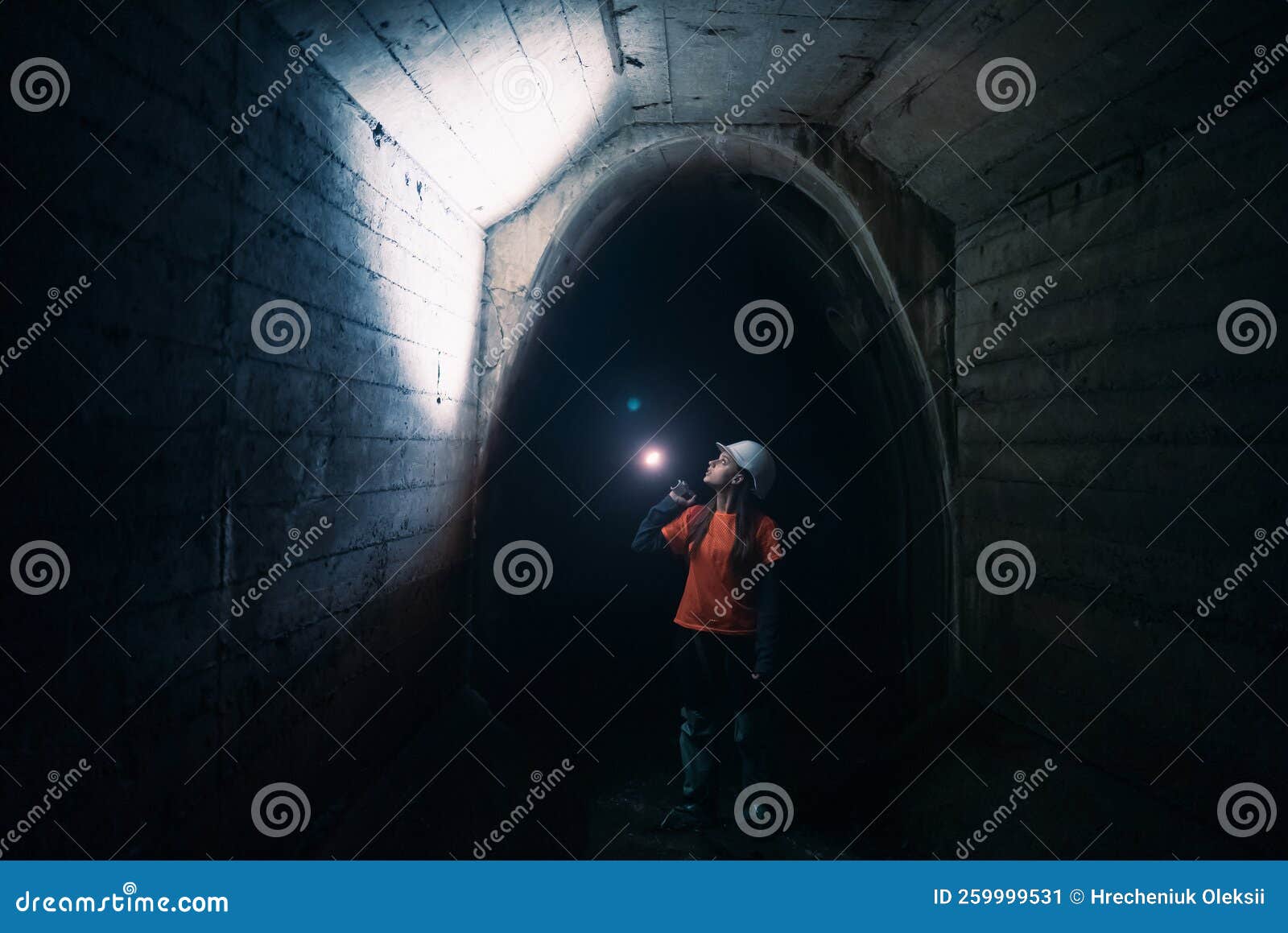 Female Digger with Flashlight Explores the Tunnel Stock Image - Image ...