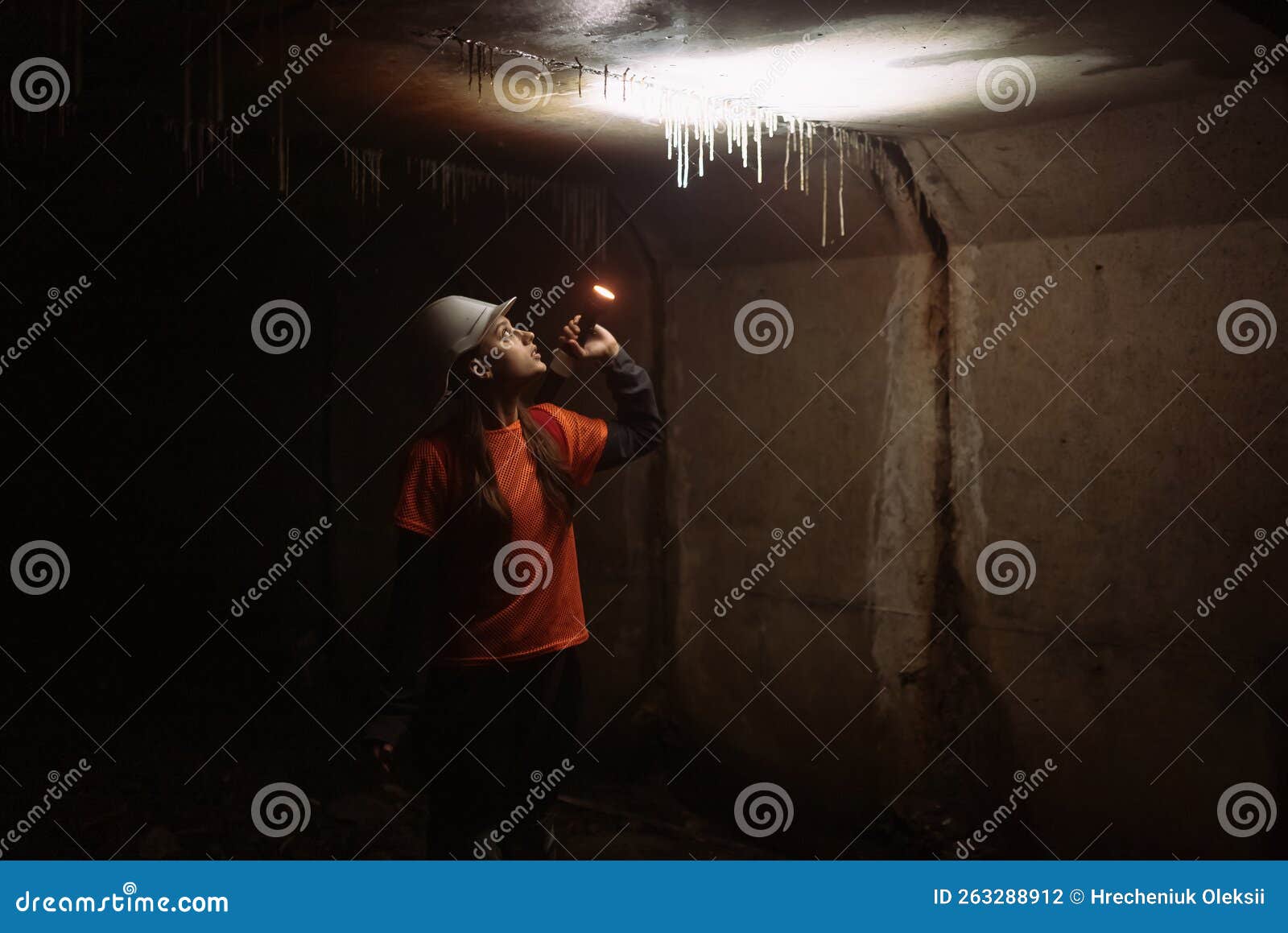 Female Digger with Flashlight Explores the Tunnel Stock Photo - Image ...