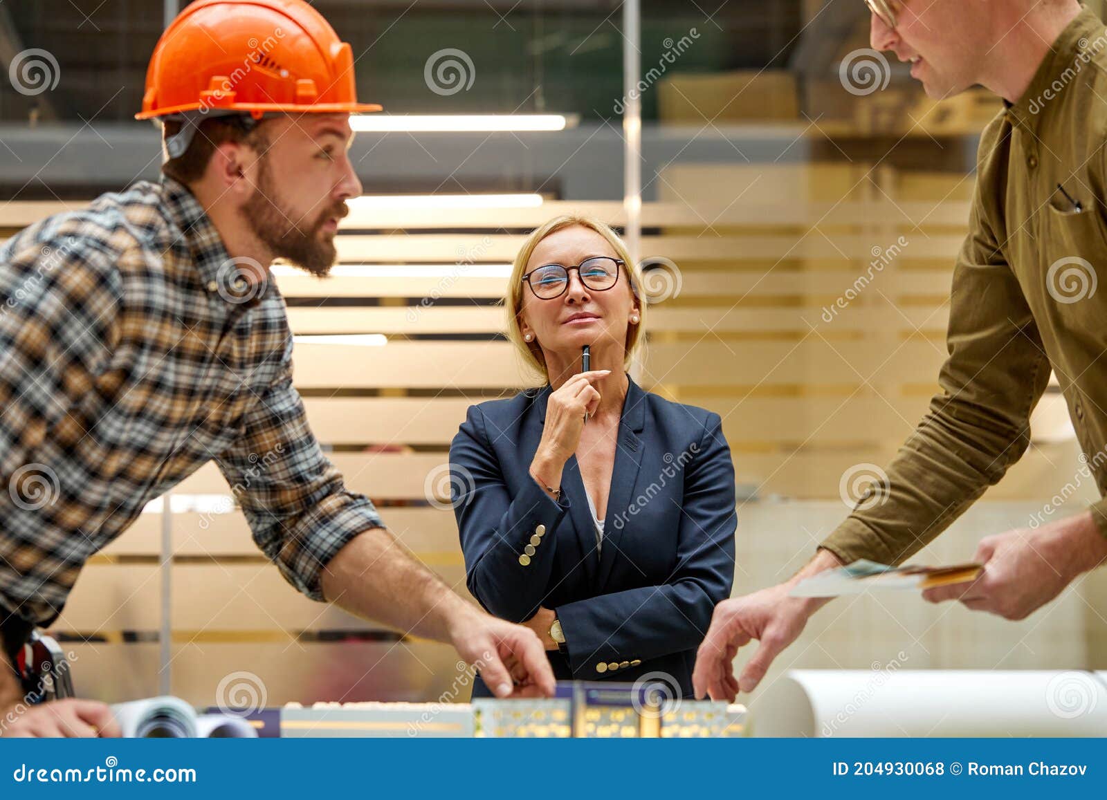 Female Director Supervising the Process of Work by Architect Stock ...