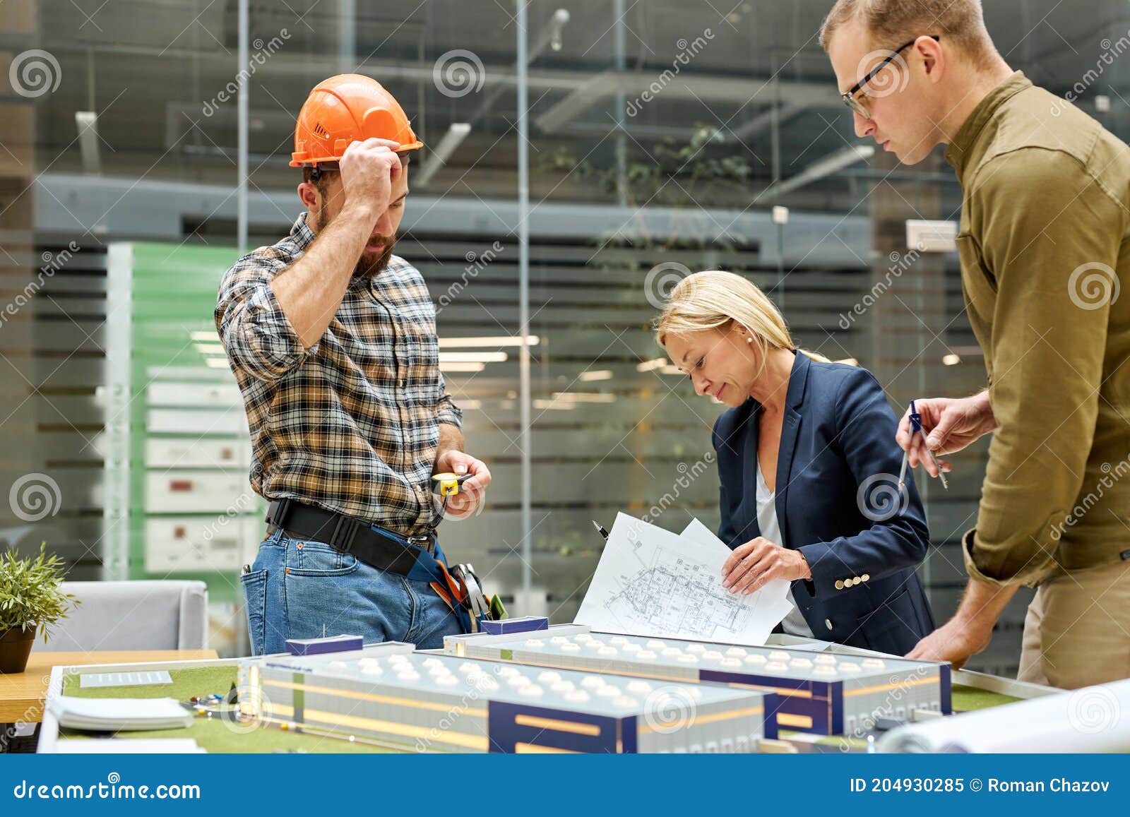 Female Director Supervising the Process of Work by Architect Stock ...