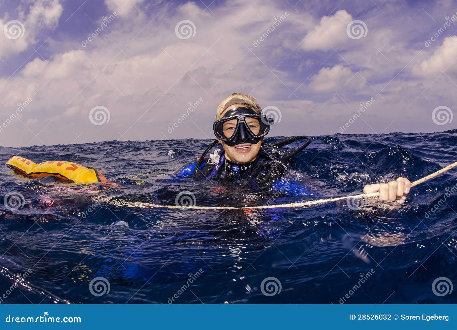 Female Diver on the Surface Editorial Photography - Image of wetsuit ...